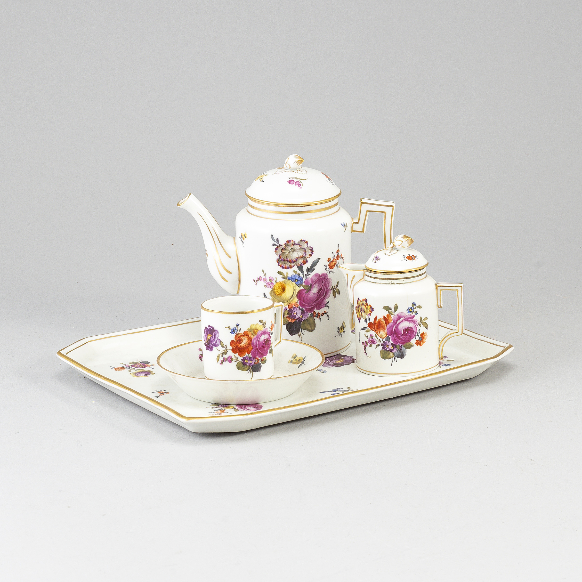 A group of four porcelain tea and coffe service, Germany, 19th century ...