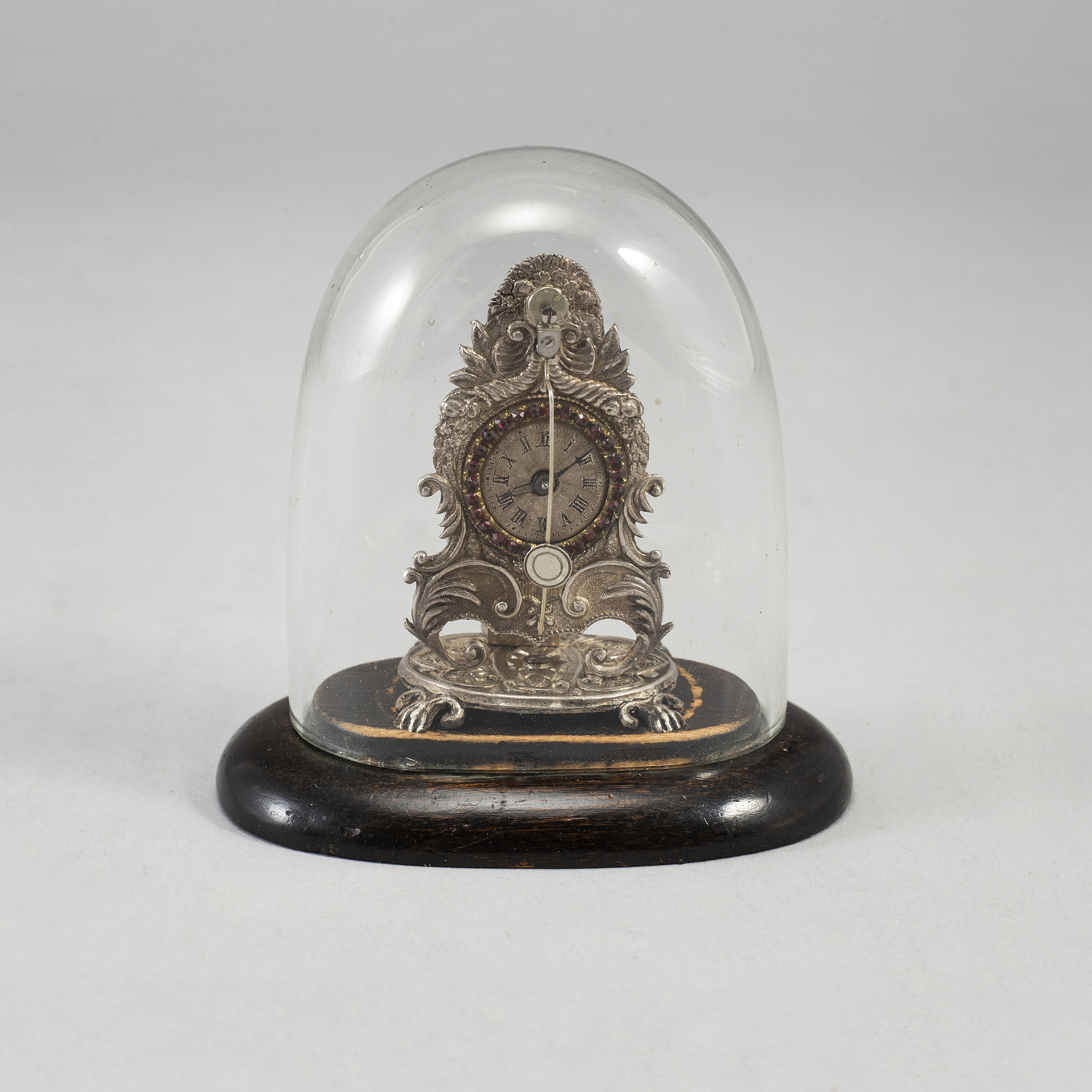A 19th century miniature silver mantle clock. - Bukowskis