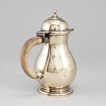 An English 20th century Britannia silver-gilt milk-jug, marked LAC ...