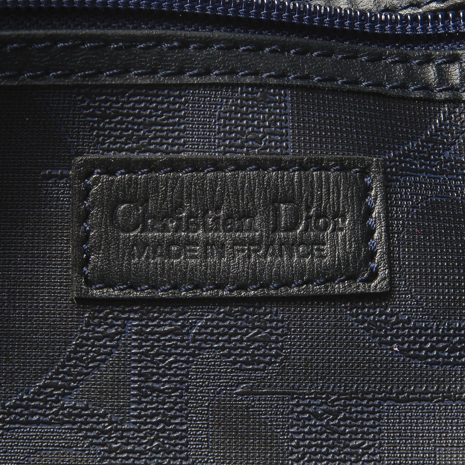 CHRISTIAN DIOR, Blue Monogram Coated Canvas Duffel Bag. - Bukowskis