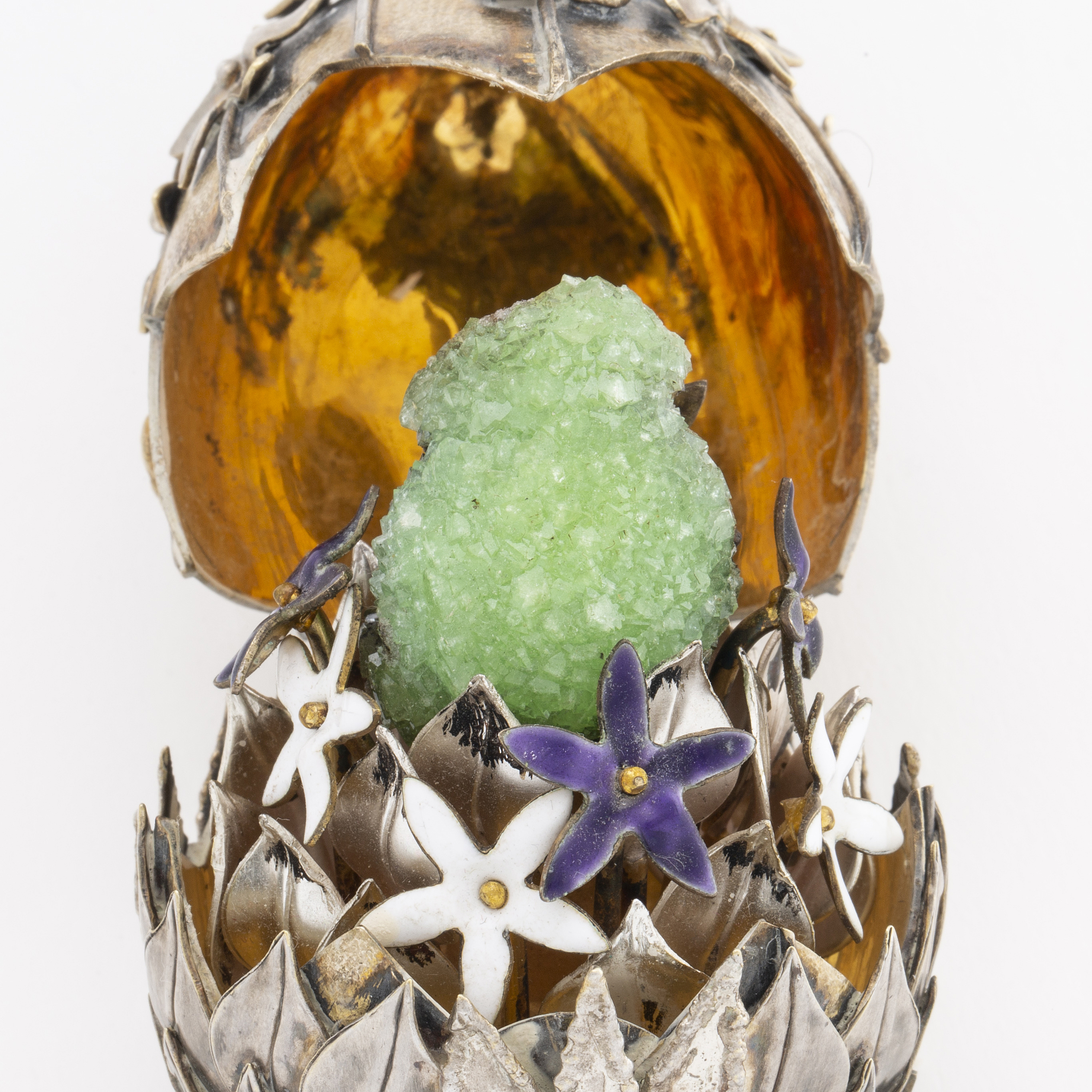 STUART DEVLIN "Surprise egg", sterling silver, enamel, green crystal ...