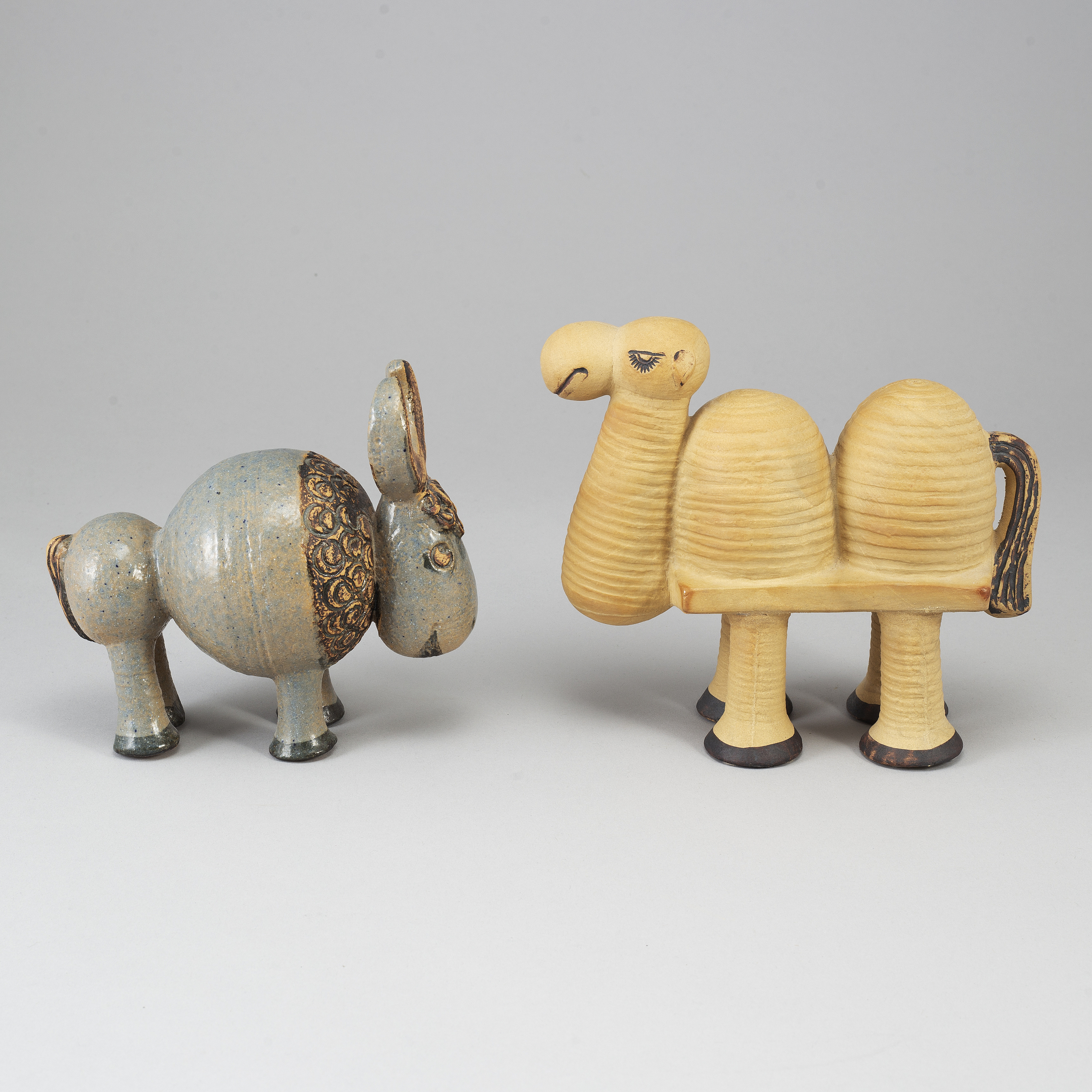 LISA LARSON, two stoneware figurines from 'Jura' Gustavsberg. Designed in 1971. - Bukowskis