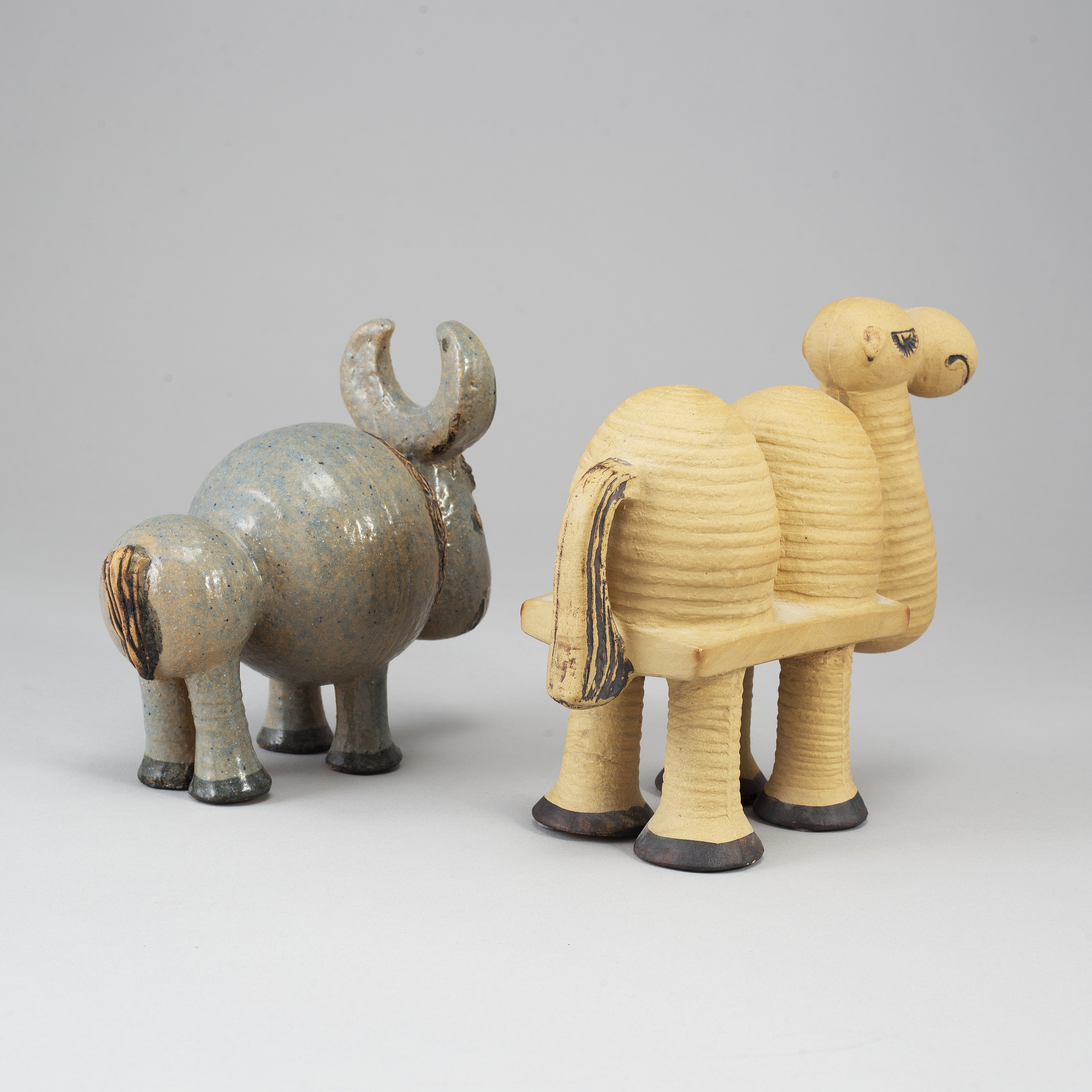 LISA LARSON, two stoneware figurines from 'Jura' Gustavsberg. Designed in 1971. - Bukowskis
