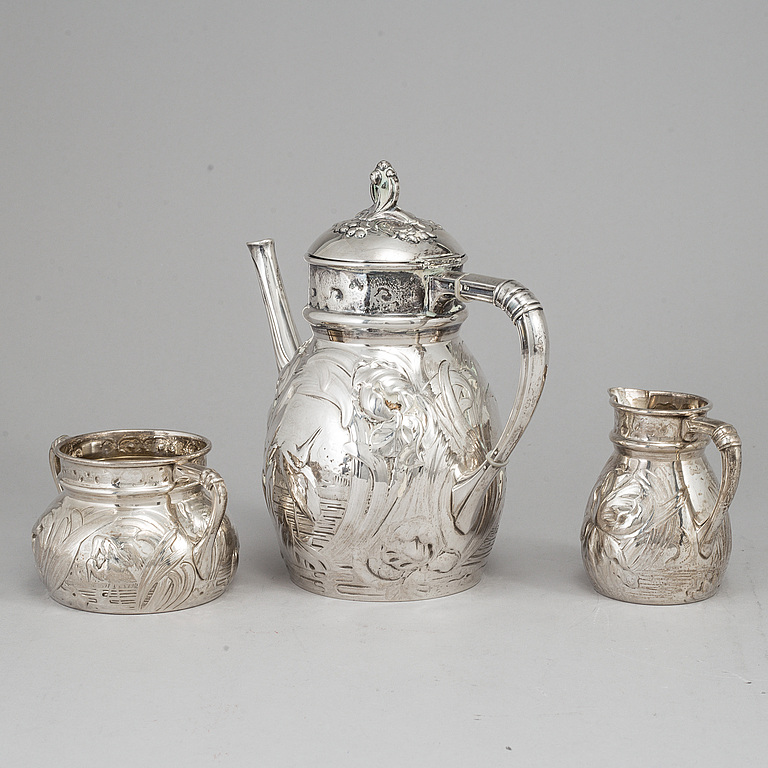 A silver coffee pot, creamer and sugar bowl, marked Emil Oscar Möller ...