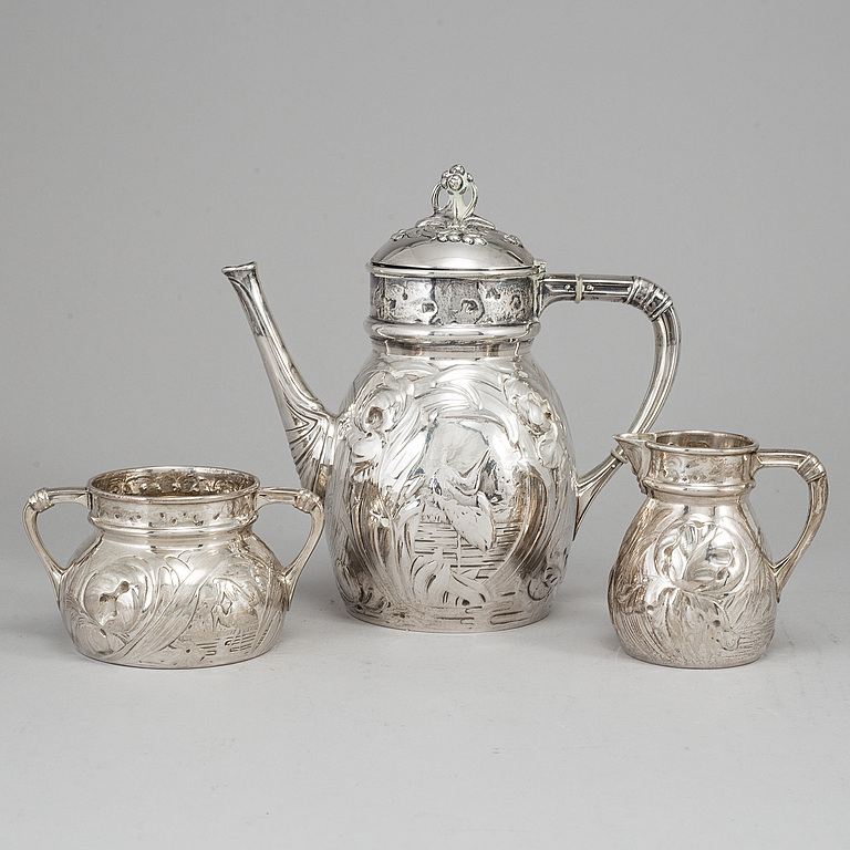 A silver coffee pot, creamer and sugar bowl, marked Emil Oscar Möller ...