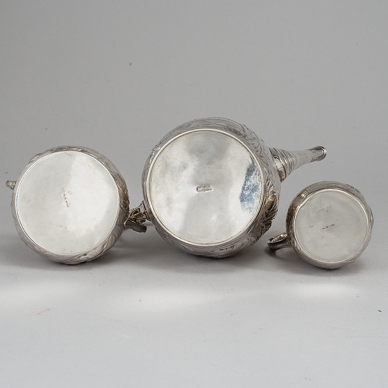 A silver coffee pot, creamer and sugar bowl, marked Emil Oscar Möller ...
