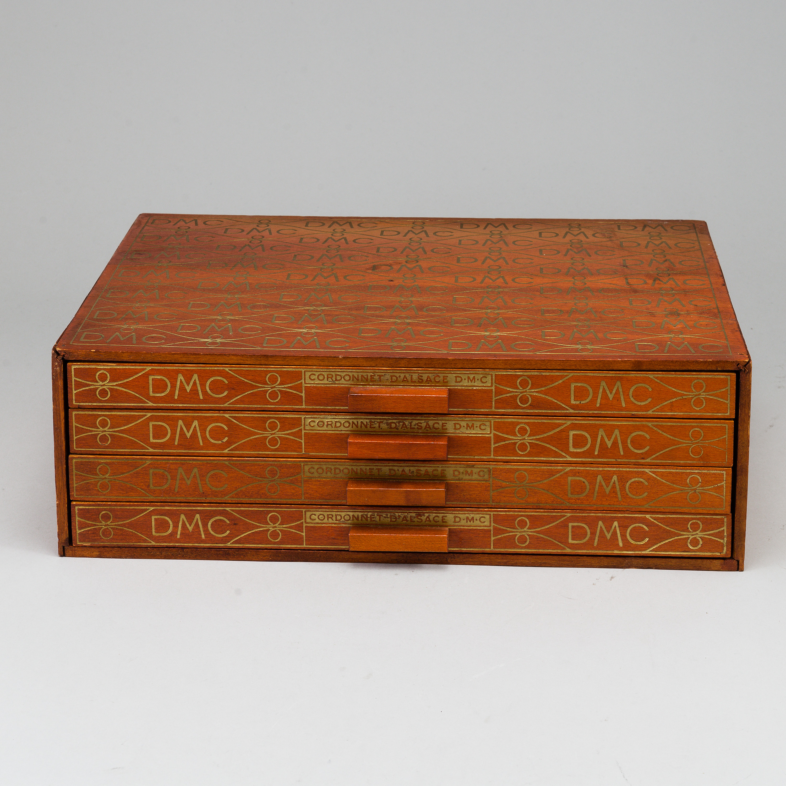 A wooden chest of drawers/box, France, DMC, 20th Century. - Bukowskis