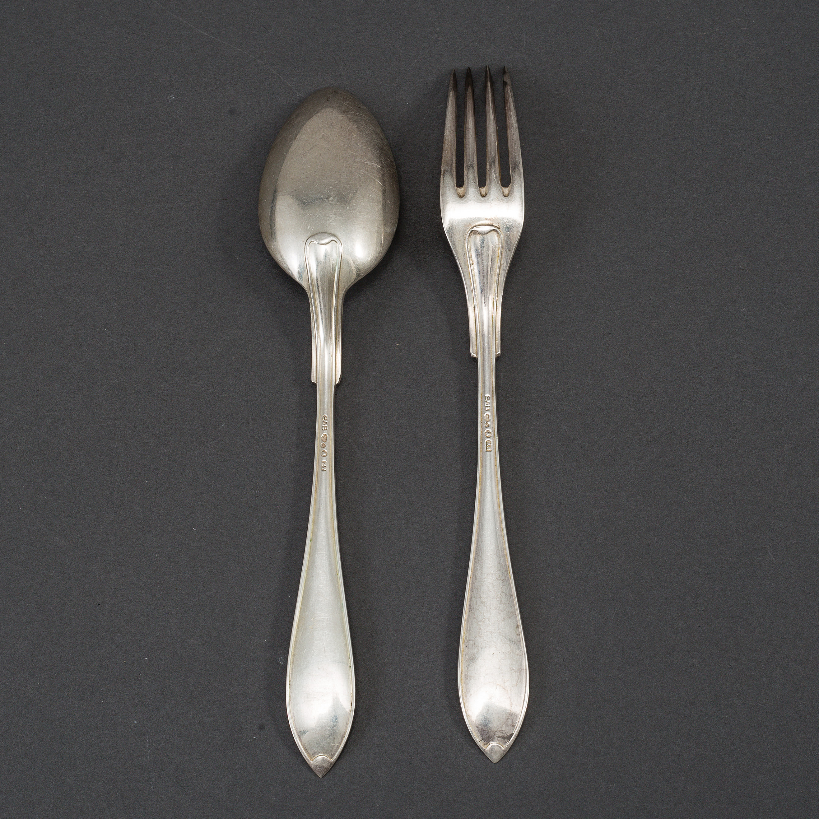 12 spoons and 12 forks, silver, GAB, Stockholm 1920's. - Bukowskis