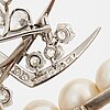 A tiara with cultured pearls and a detachable WA Bolin platinum brooch ...