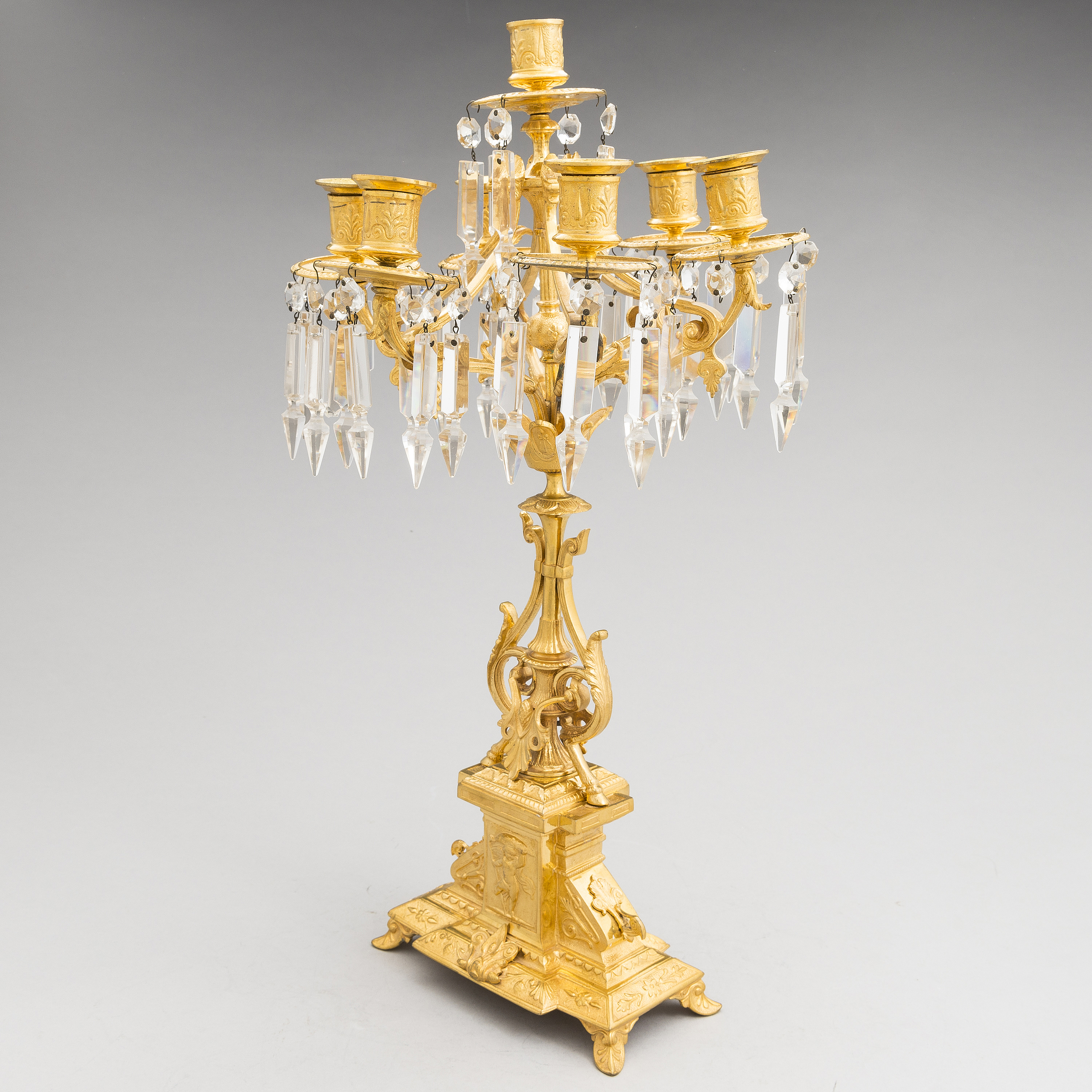 A 19th-Century candelabrum for seven candles. - Bukowskis