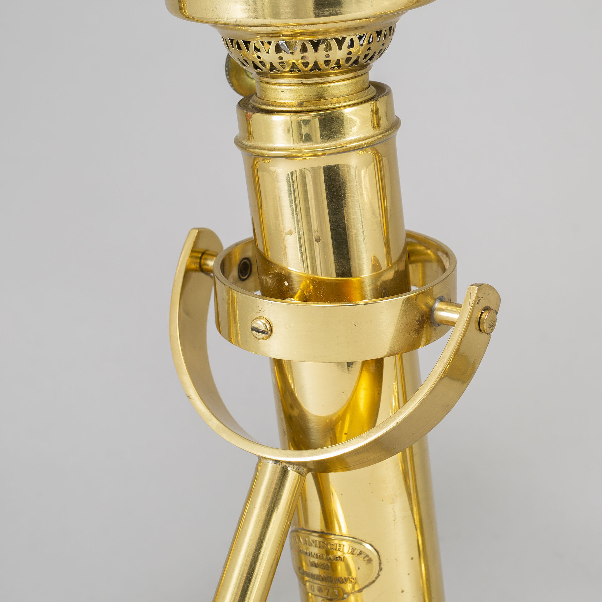 A set of three brass kerosene lamps GV Harnisch Denmark later part of ...