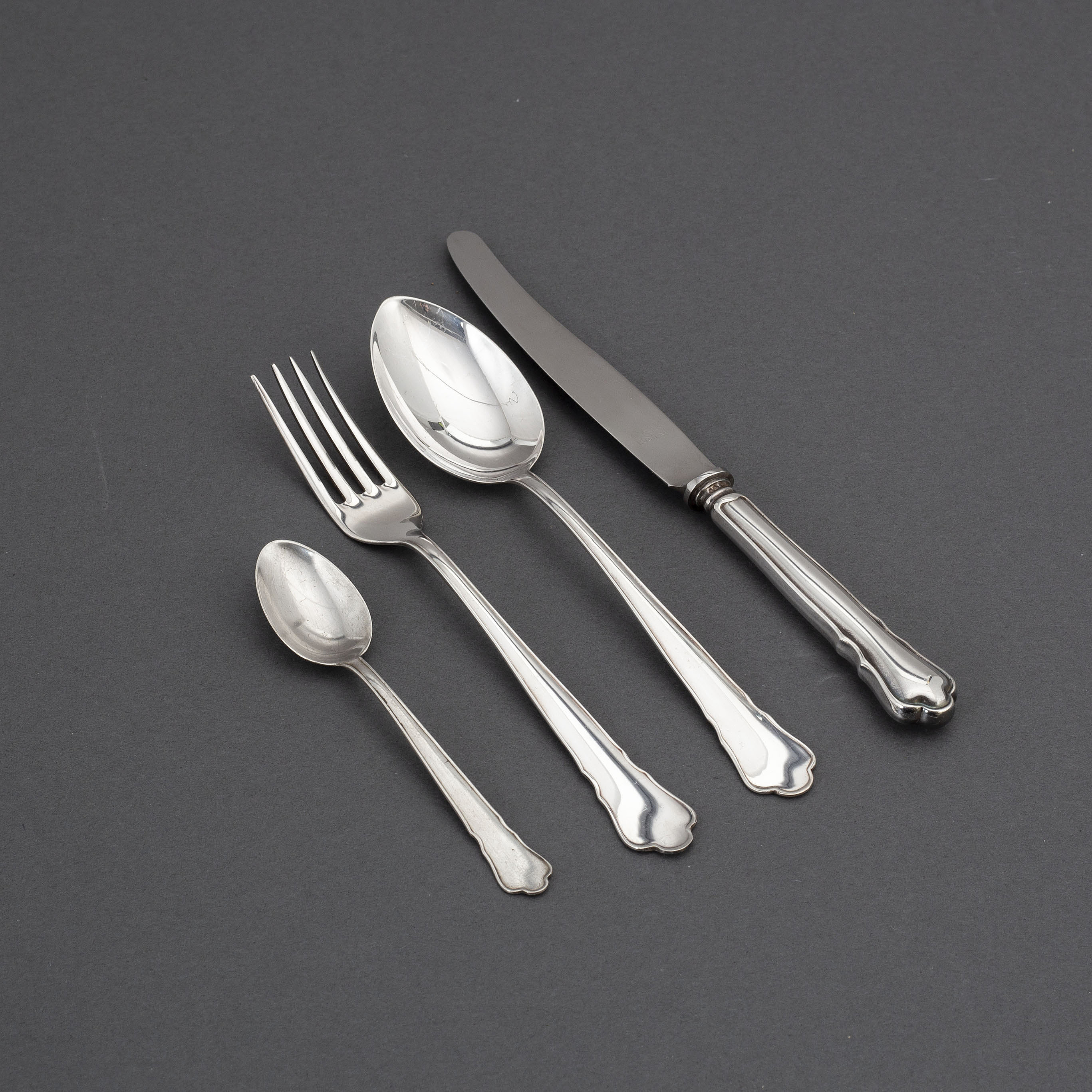 A 'Chippendale' silver cutlery, GAB, some Stockholm 1954 (48 pc ...