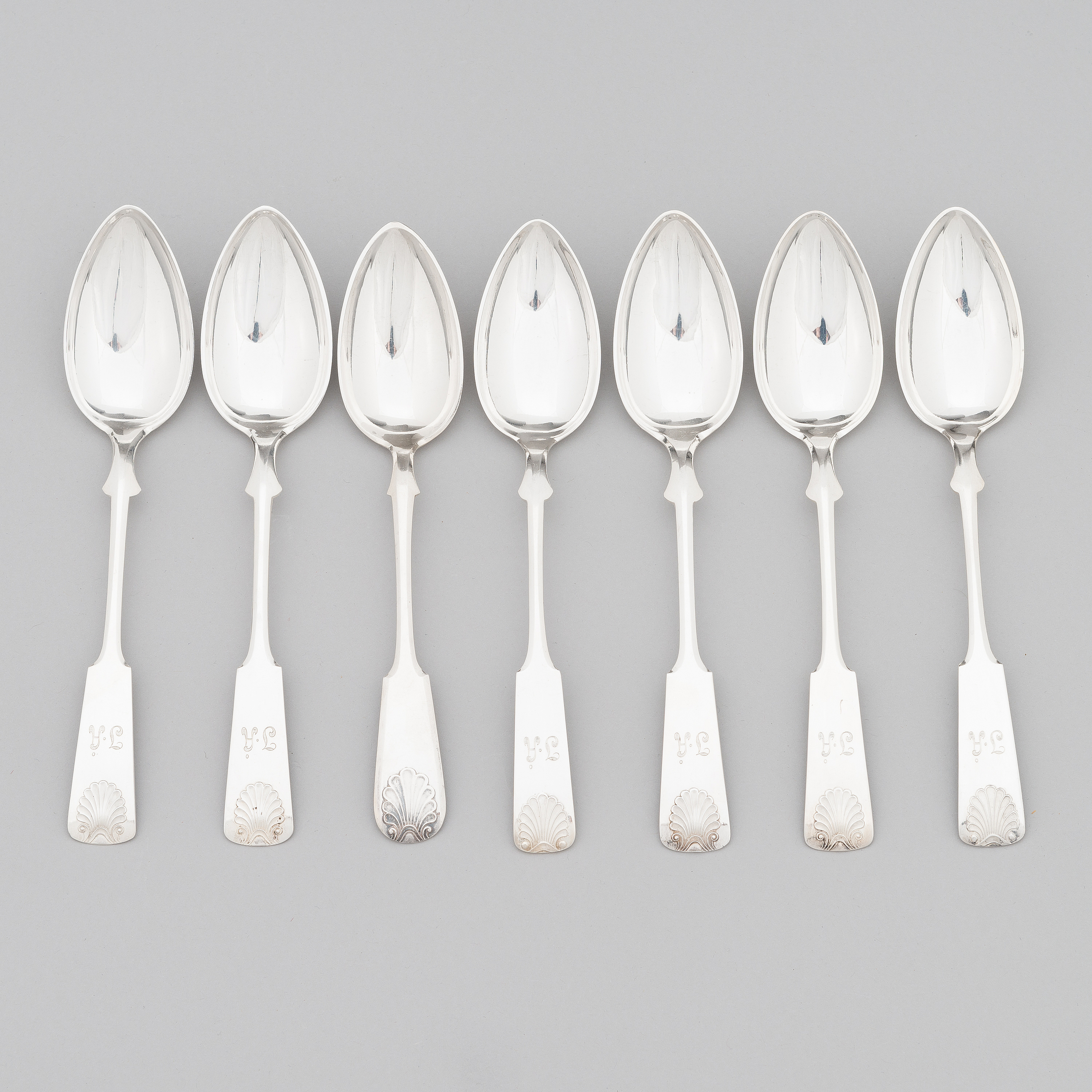 A 42-piece set of silver cutlery with seashell decorated handles ...