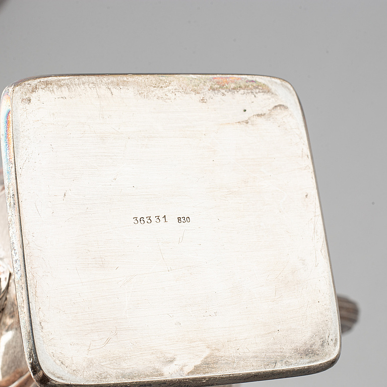 An art nouveau silver coffee pot, sugar bowl and creamer, mark of CF ...