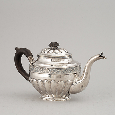 A Russian 19th century parcel-gilt silver tea-pot, marked Moscow 1833 ...