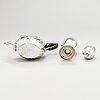 A sterling silver teapot and sugar caster, England 1900 and 1924 ...