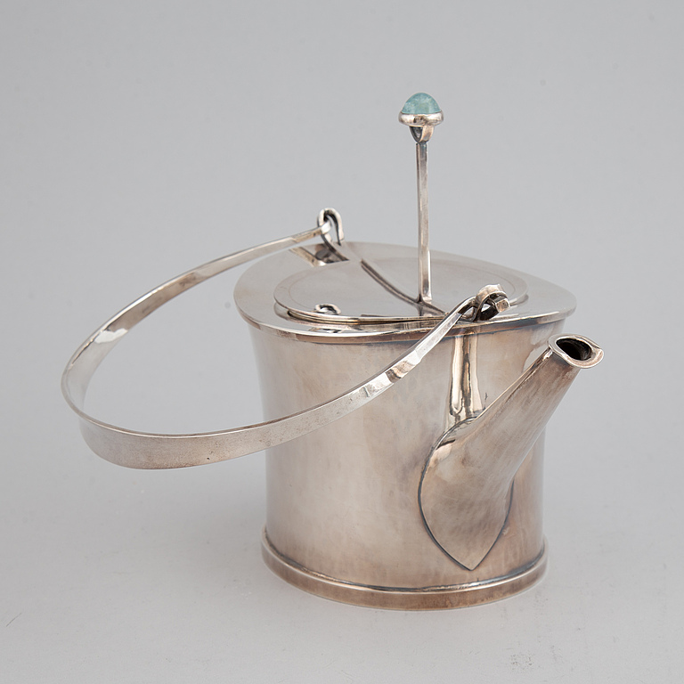 A silver teapot with crystal by Martin Öhman, Halmstad 1977. - Bukowskis