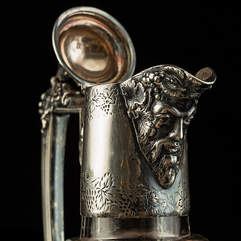 A silver and glass claret jug, Martin, Hall & Co, Sheffield, England ...
