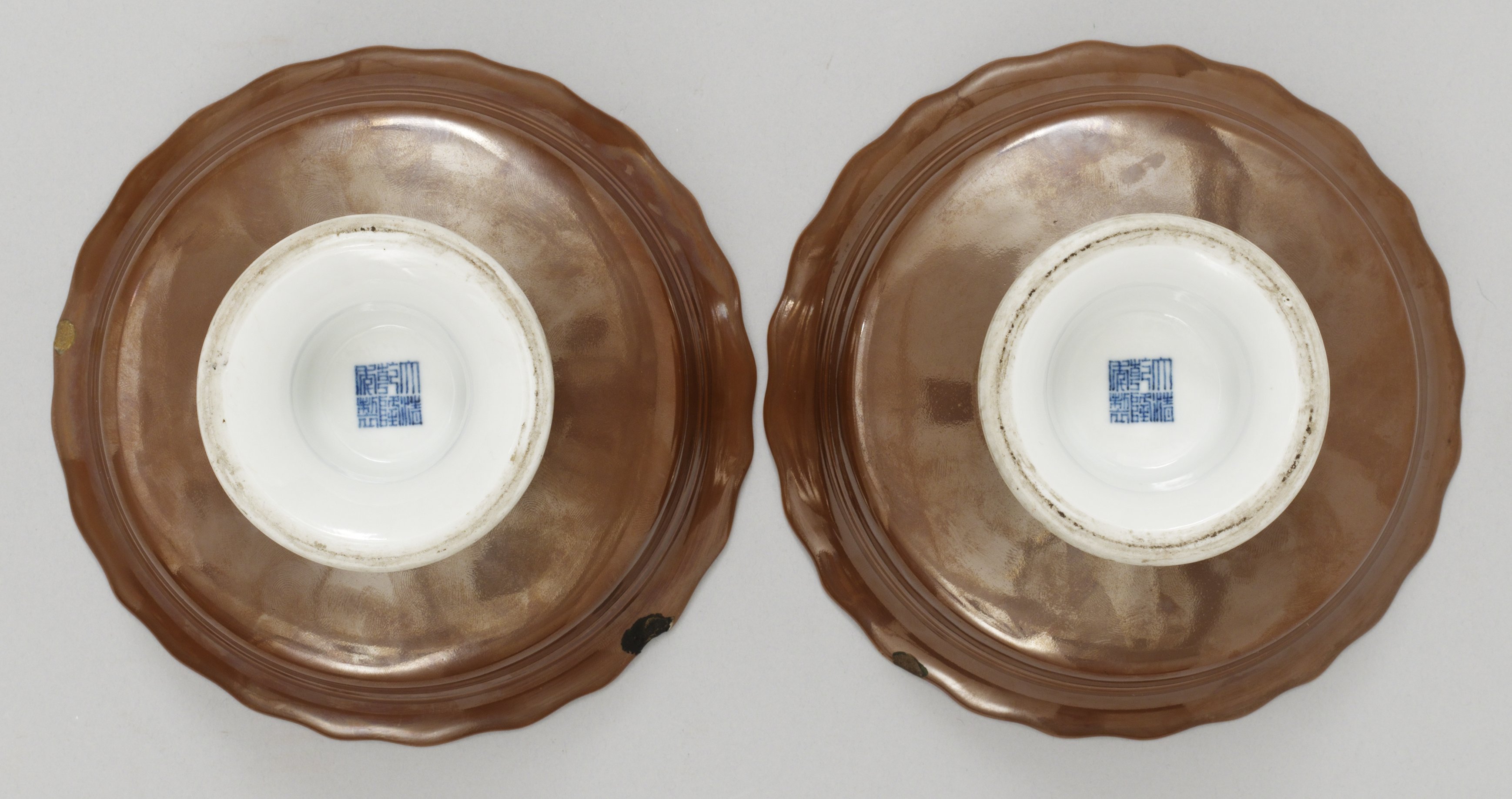 A pair of cappuciner glazed tazzas, China, with Qianlong seal mark ...