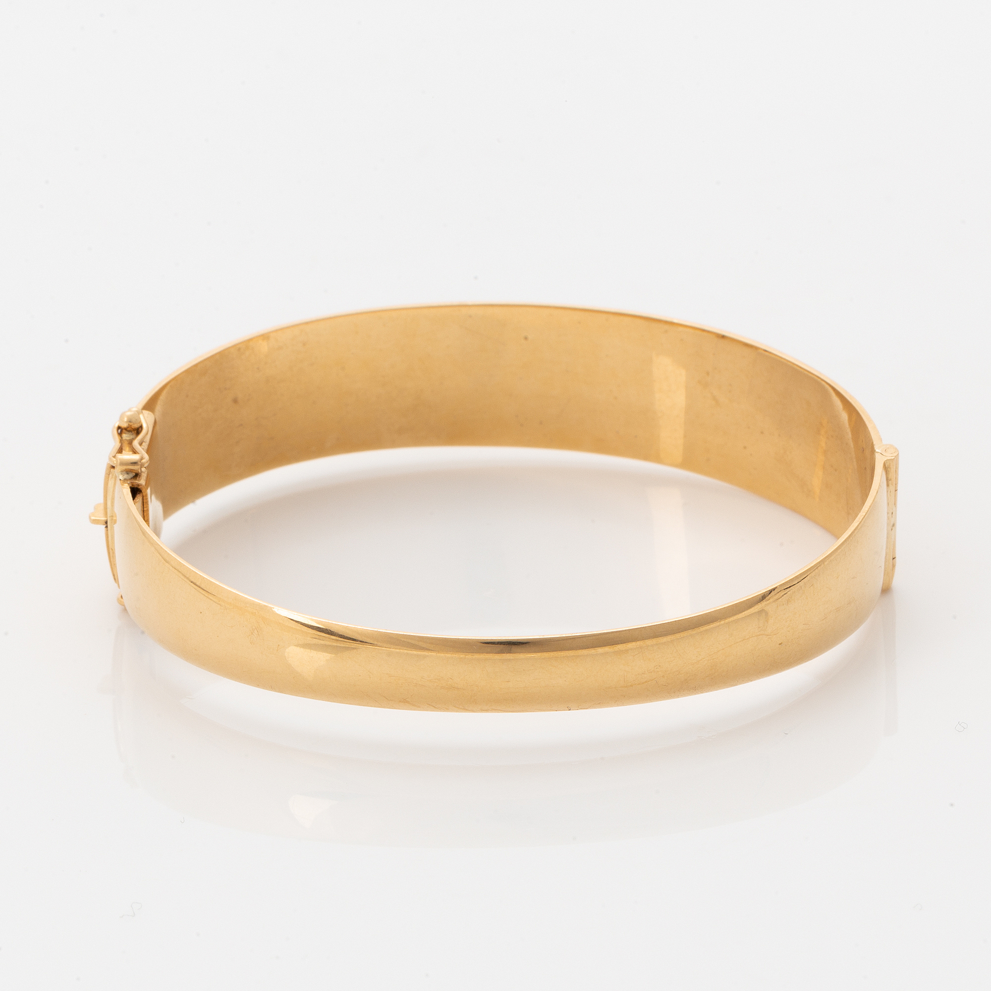 Armring 18K guld, - Bukowskis