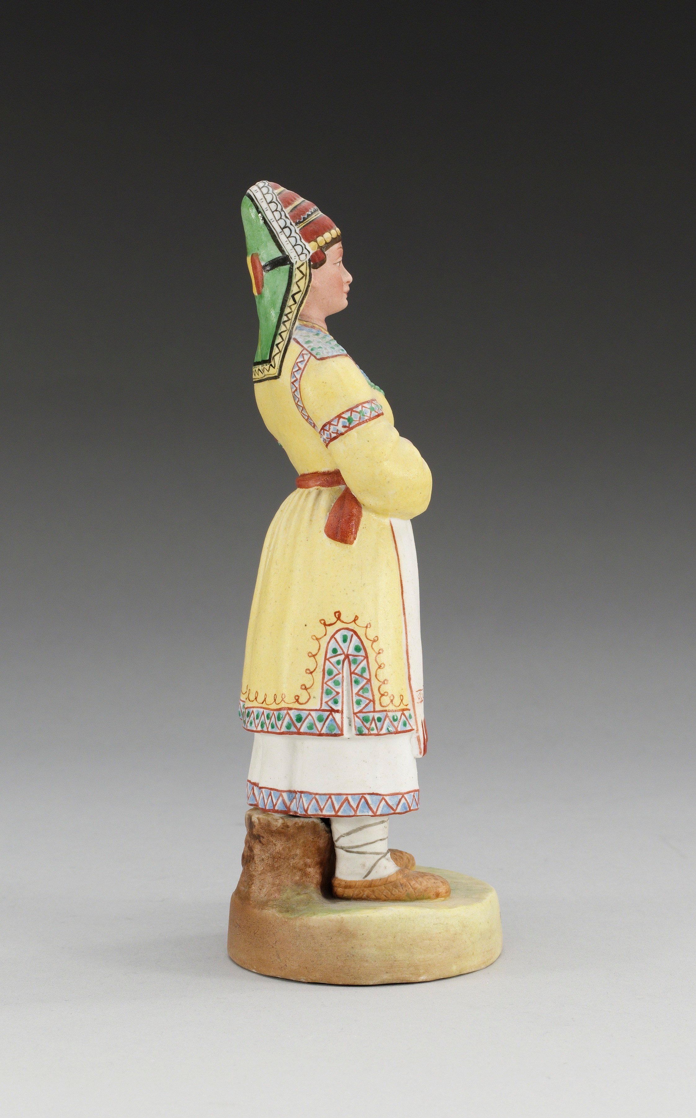 A unmarked Russian bisquit figure depicting a Mordvinian woman, ca 1900 ...