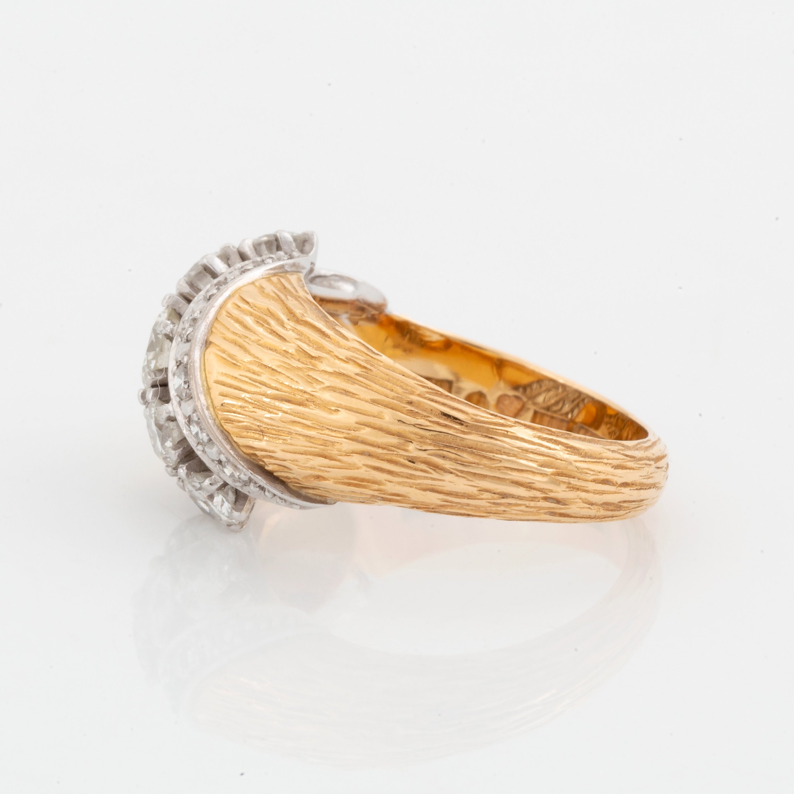 A WA Bolin ring in 18K gold set with round brilliant-cut diamonds ...
