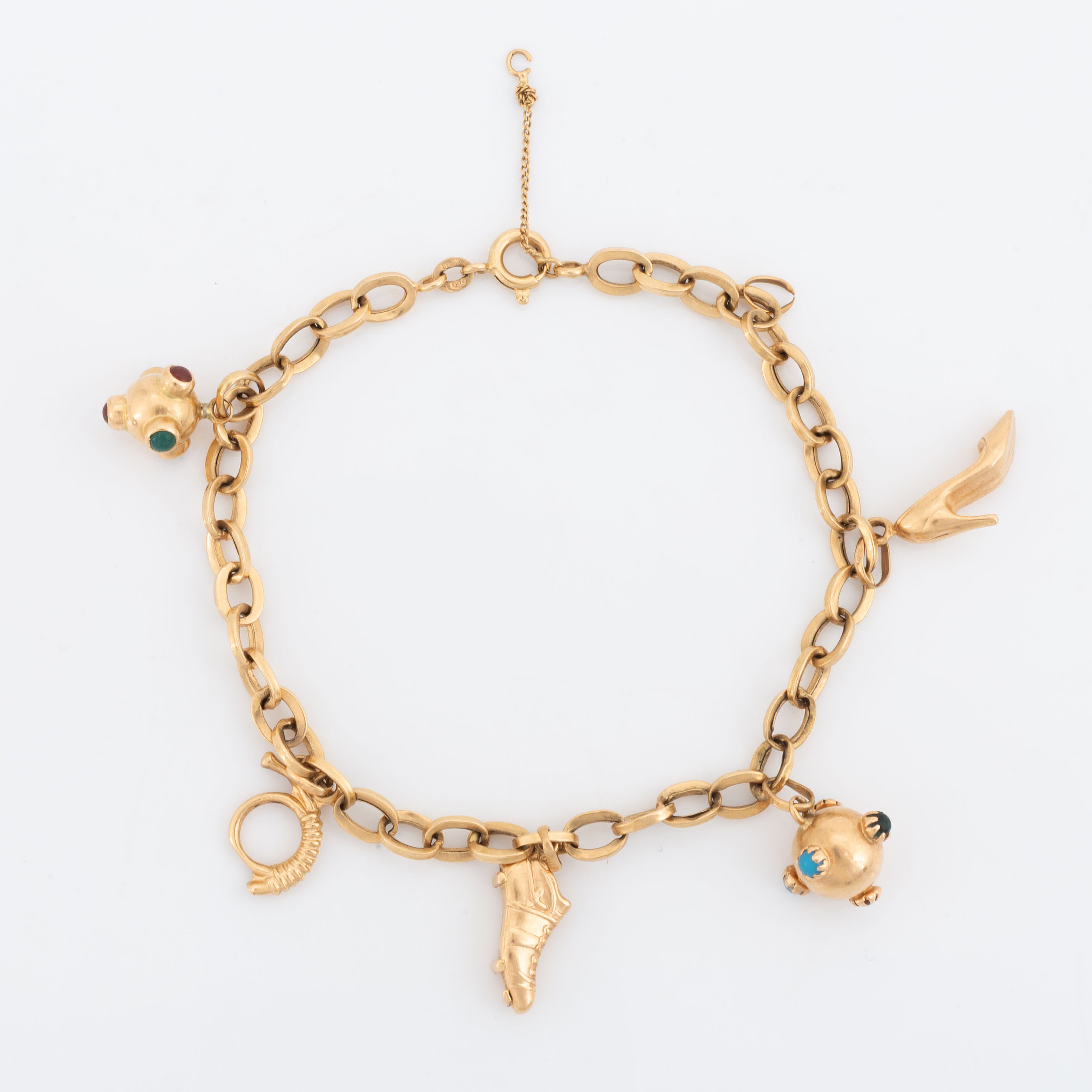 Armband, 18K guld, med berlocker. - Bukowskis