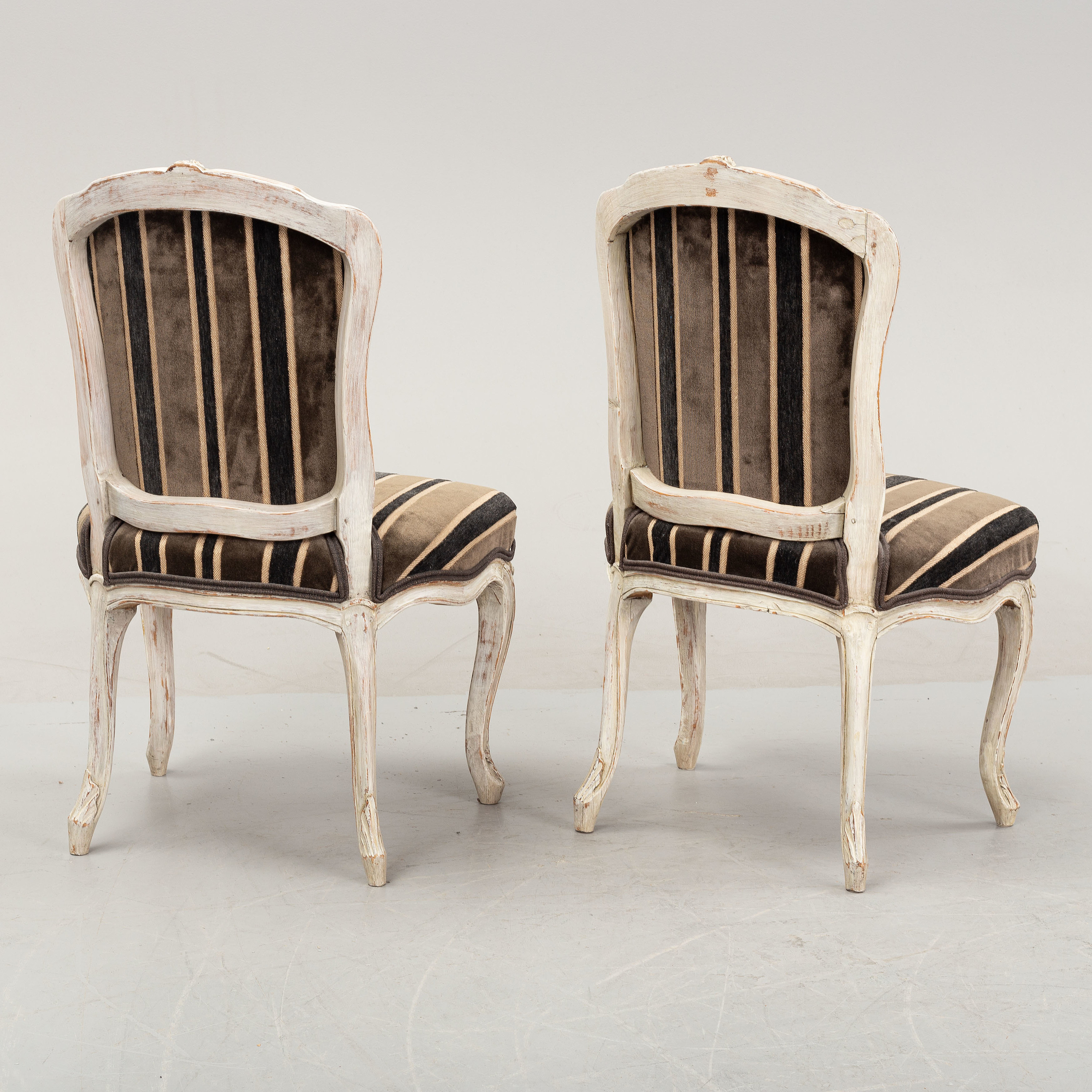 A matched set of six painted french rococo chairs, mid 18th Century ...