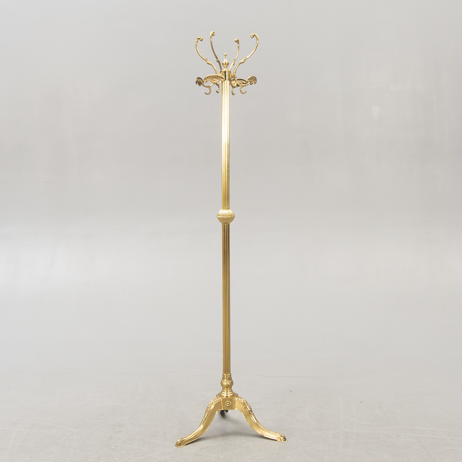 A modern brass coat hanger. - Bukowskis
