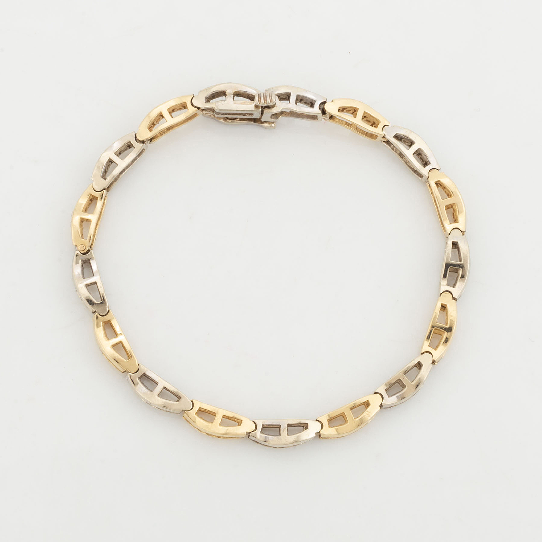 14K gold and brilliant cut diamond bracelet, with extra link. - Bukowskis
