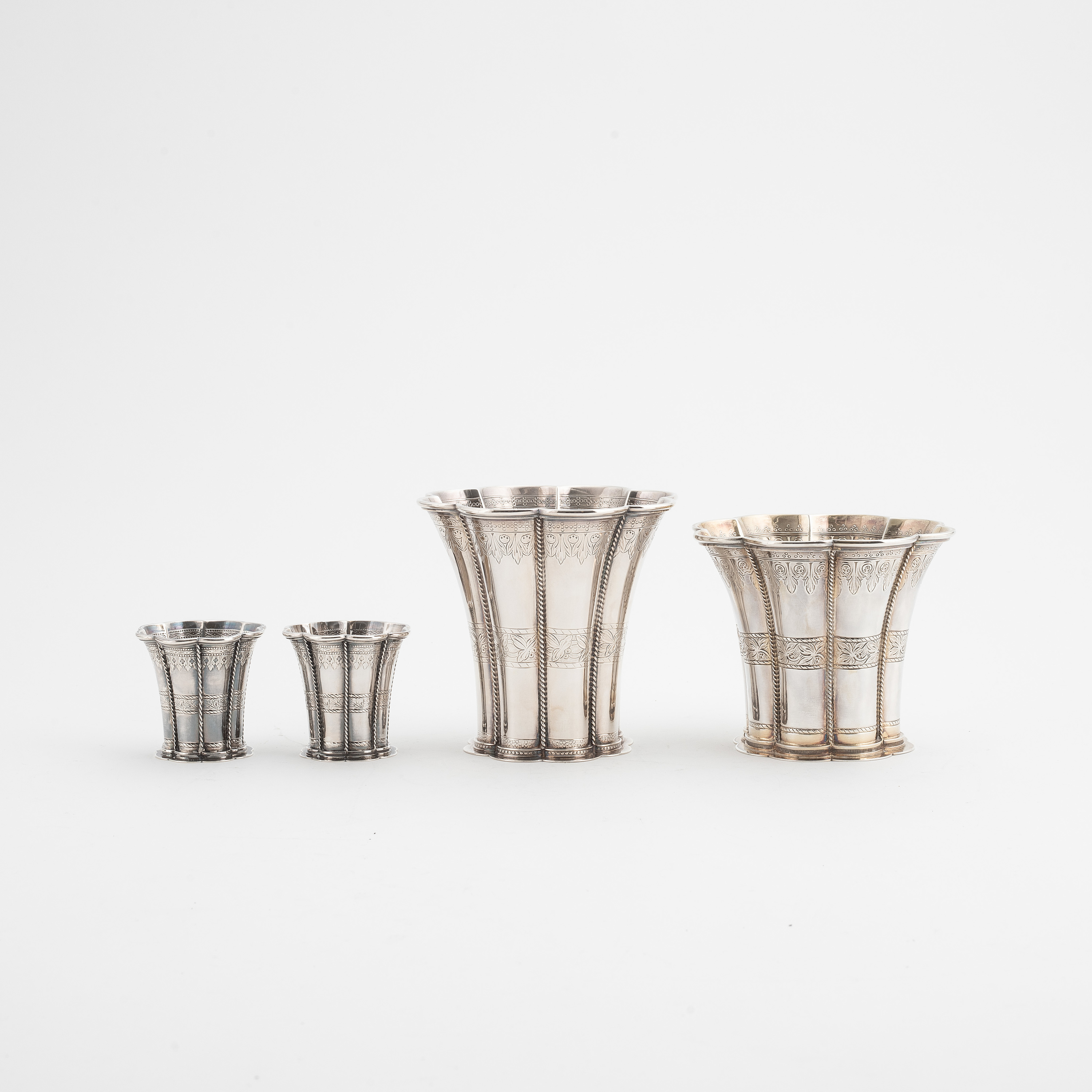 Four sterling silver beakers, including Edvard Andersen, Denmark ...