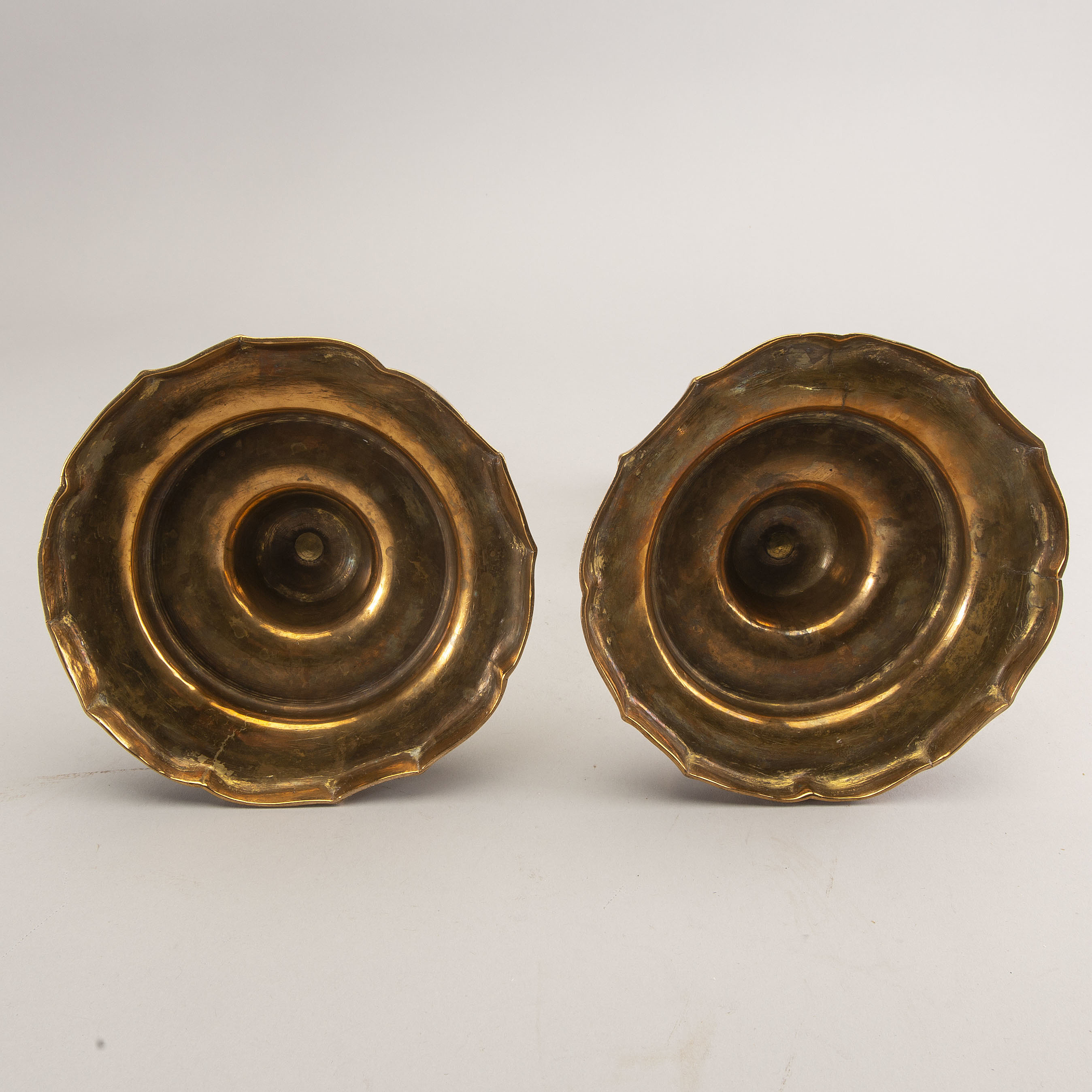 A pair of Rococo style brass candlesticks, 19th Century. - Bukowskis