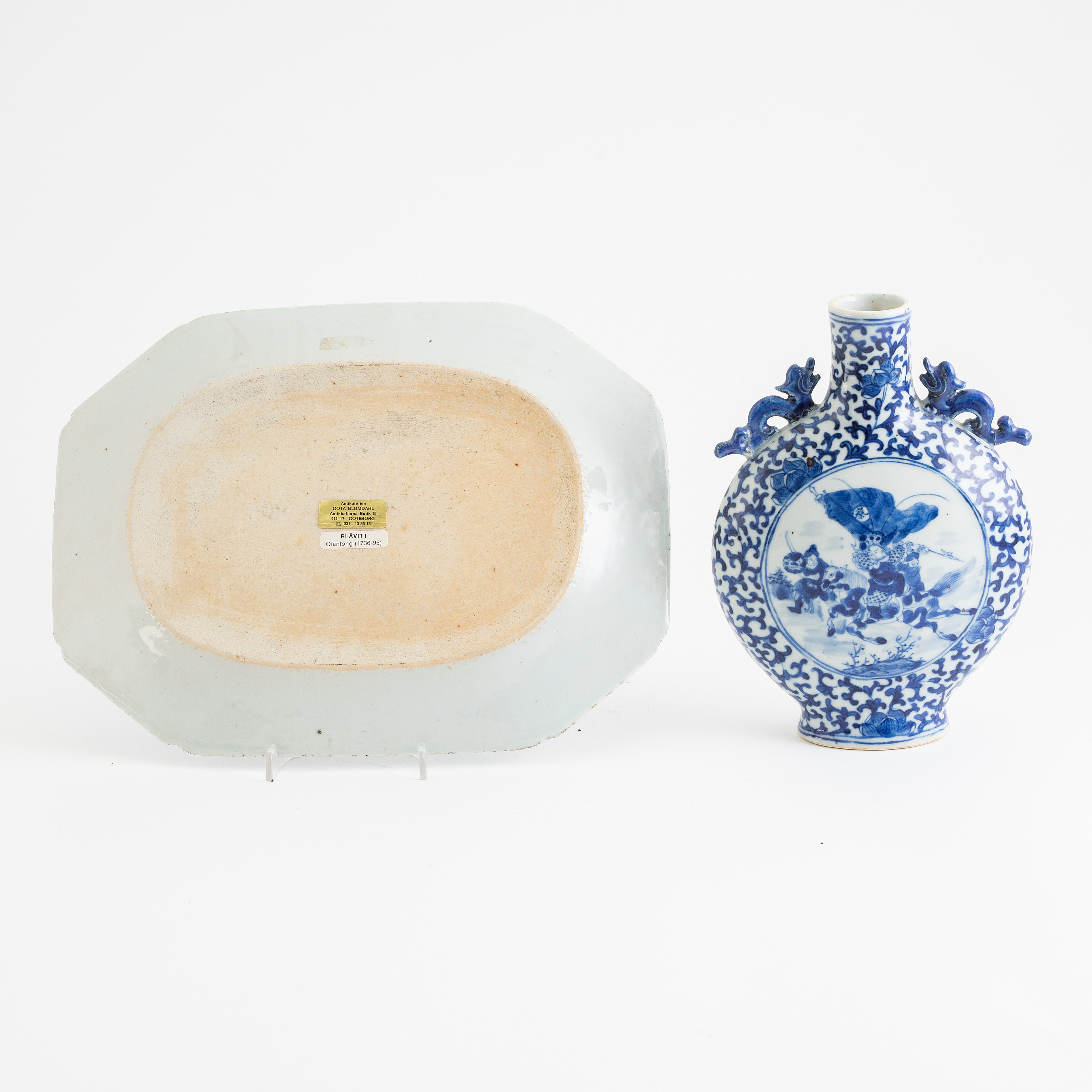 A Chinese blue and white serving dish and moon flask, Qing dynasty ...