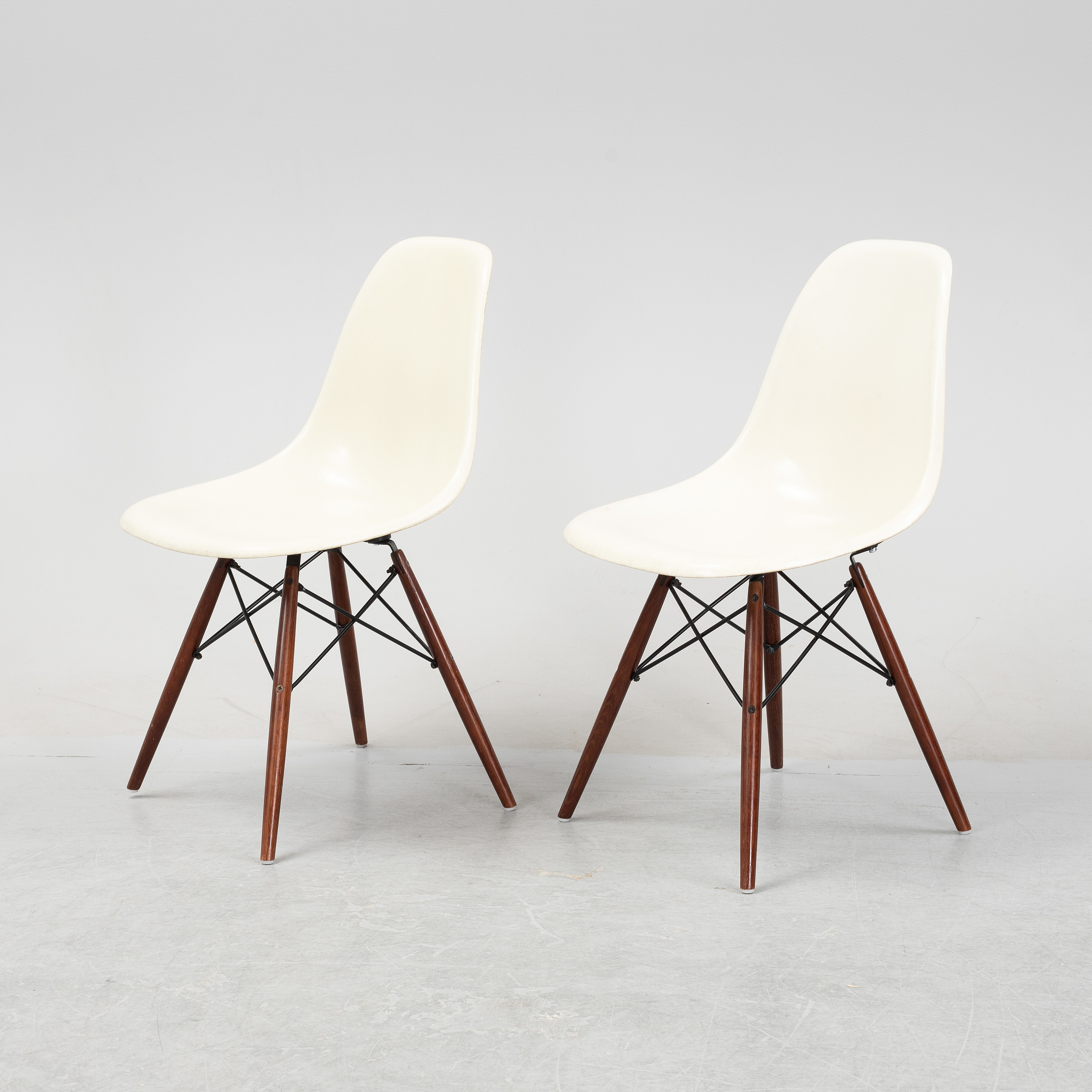 A set of six Plastic Chairs DSW with later stands, by Charles and Ray ...