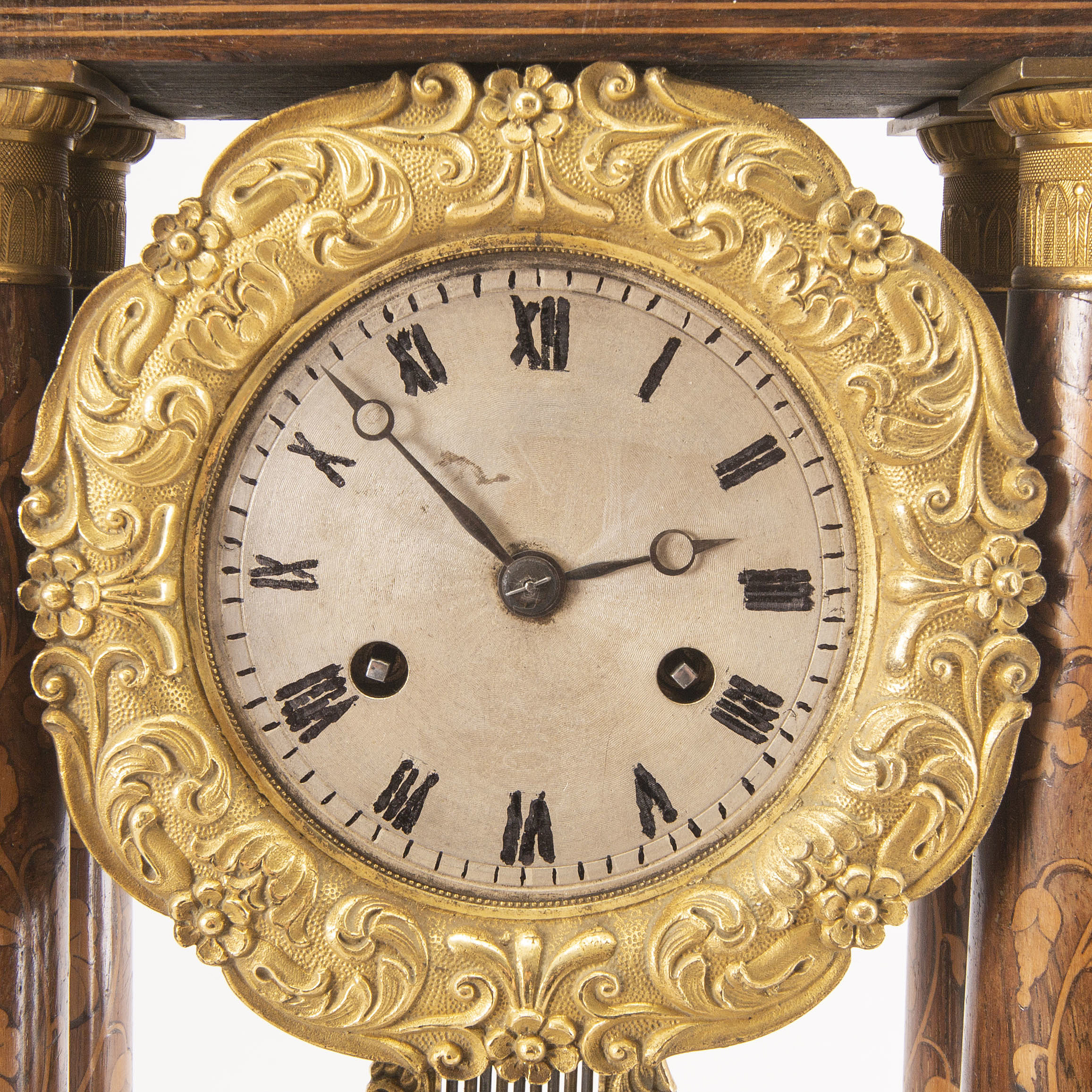 A late Empire mid 19th century veneered table clock. - Bukowskis