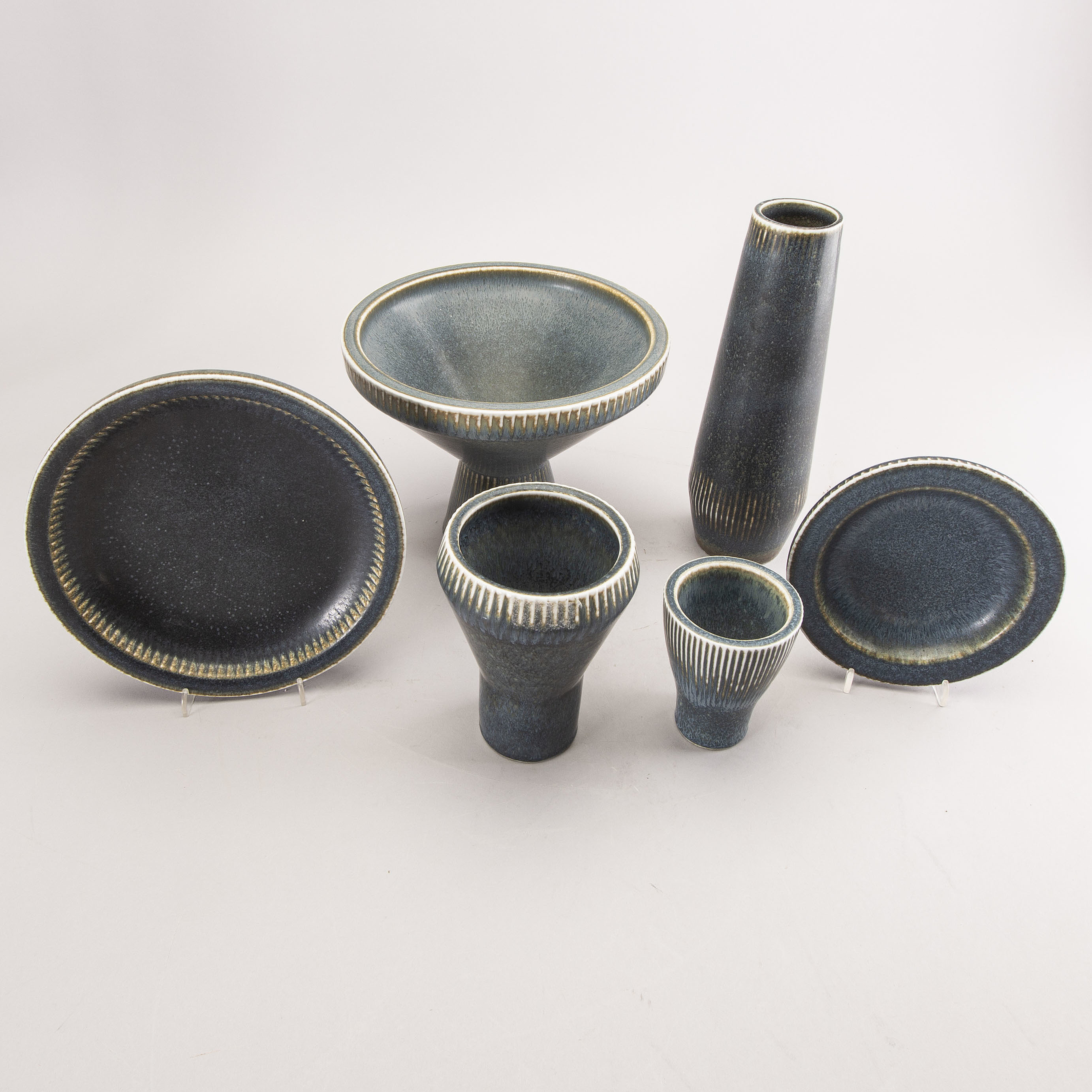 Carl-Harry Stålhane, a set of six stoneware "Magnific" bowls and vases ...