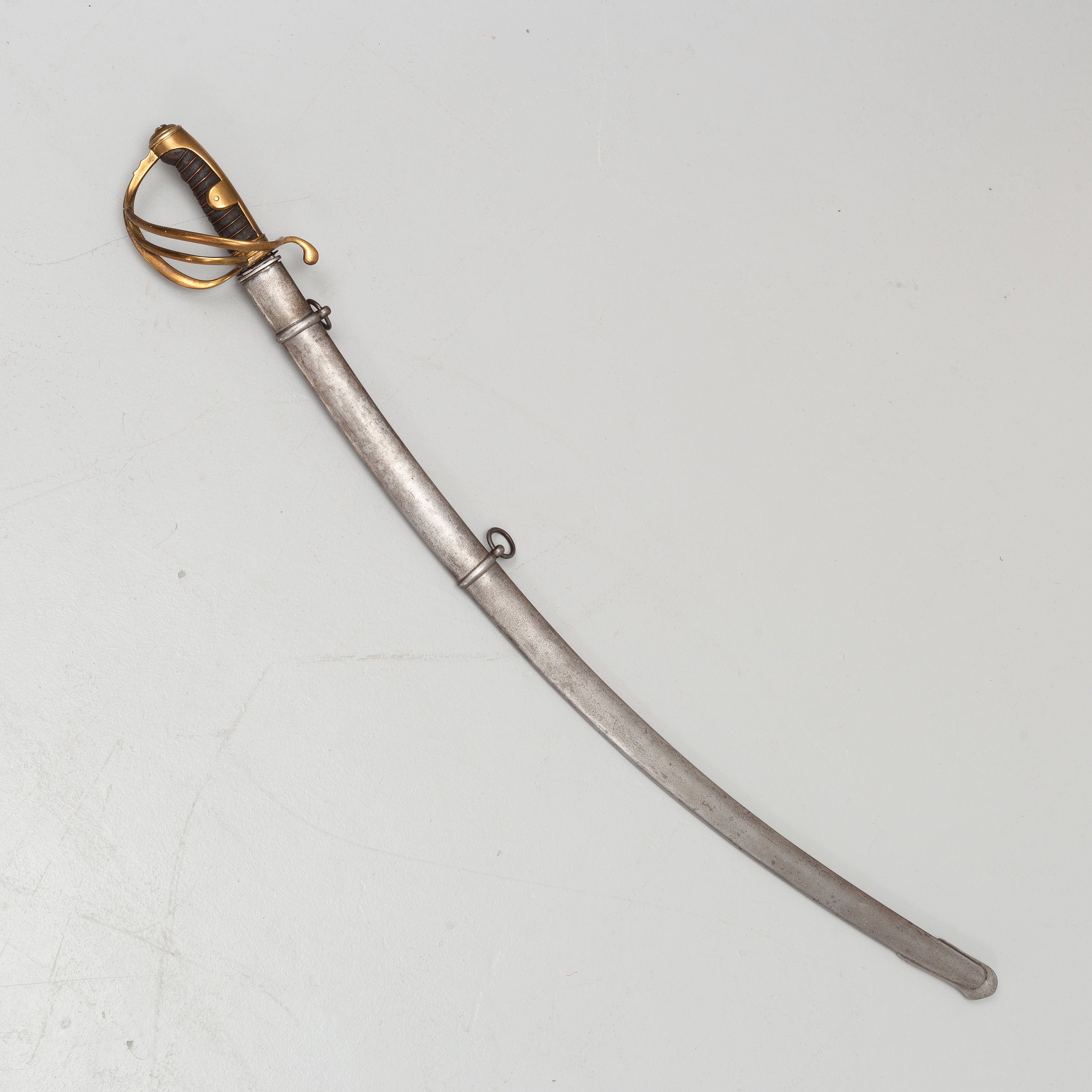 An 19th Century curved officer's sword with etched blade and steel ...