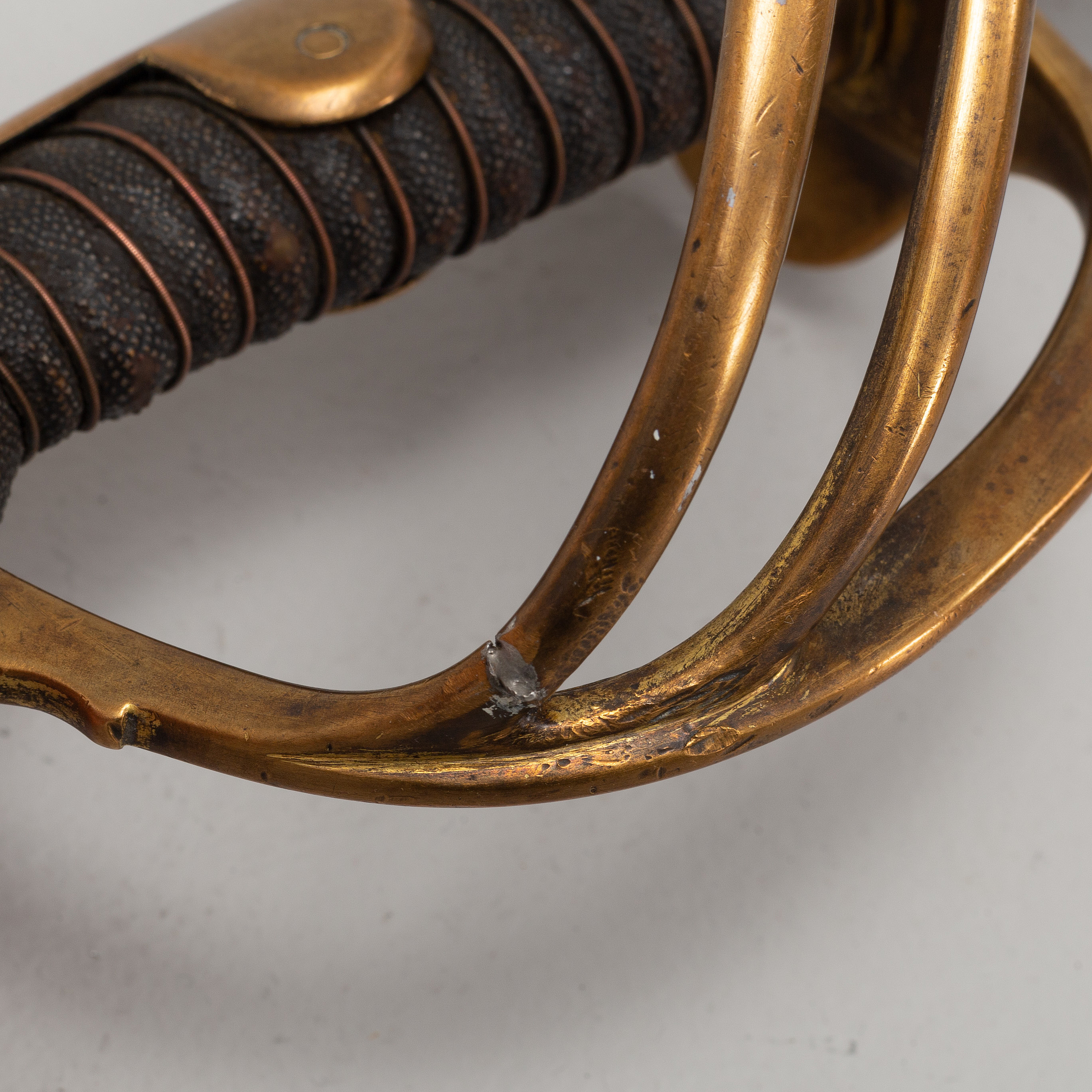 An 19th Century curved officer's sword with etched blade and steel ...