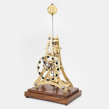 A 'Concorde' brass electric mantel clock, made by Frederick Whitlock ...
