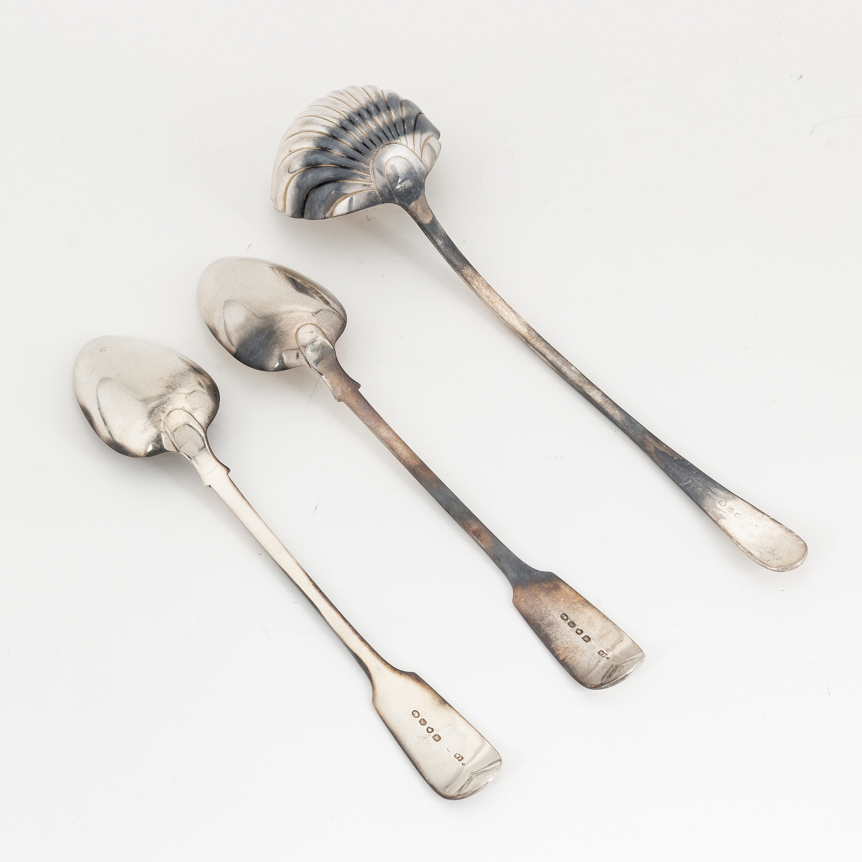 A pair of silver serving spoons and a soup ladle, London, England ...