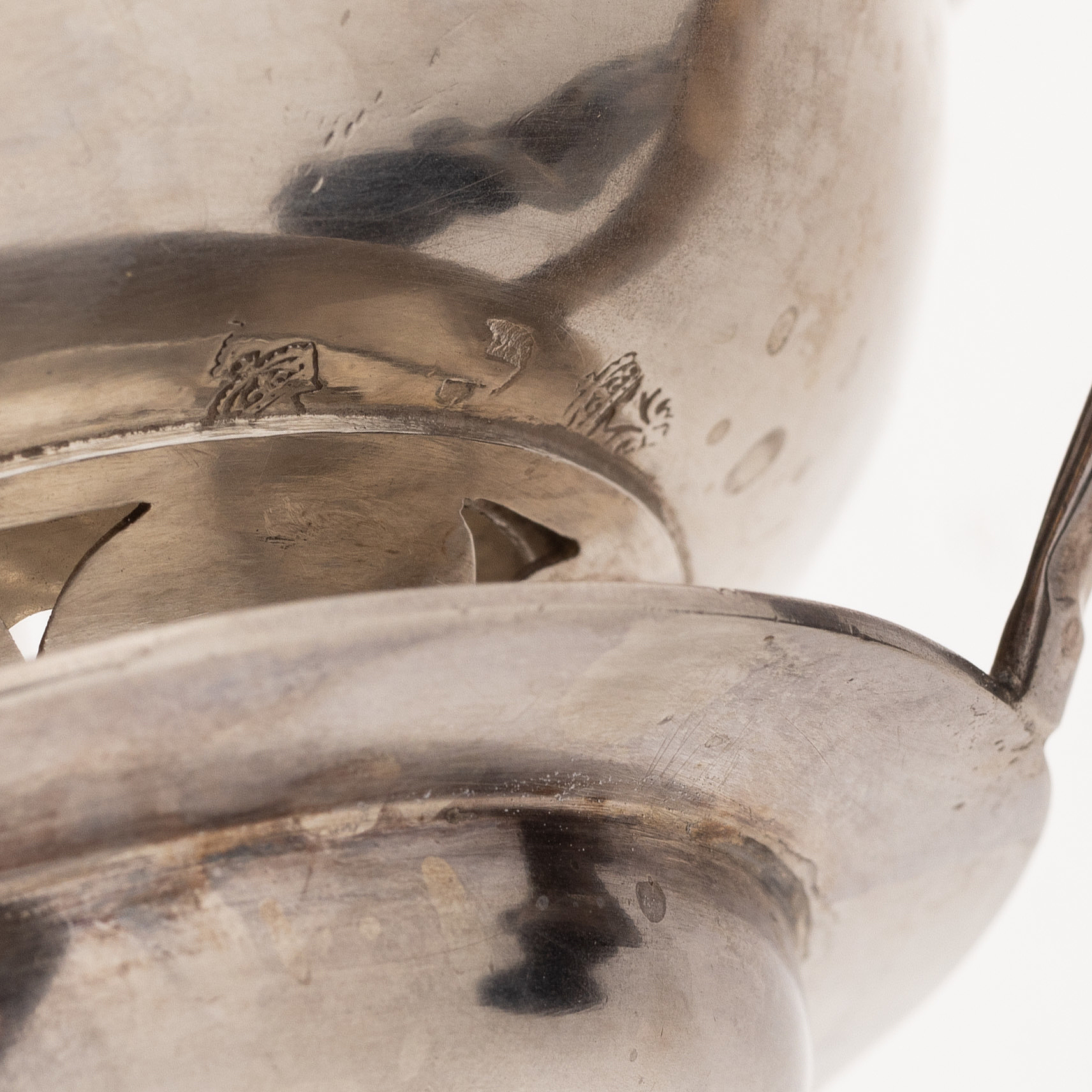 A silver burner, pseudo-marks, late 19th century. - Bukowskis