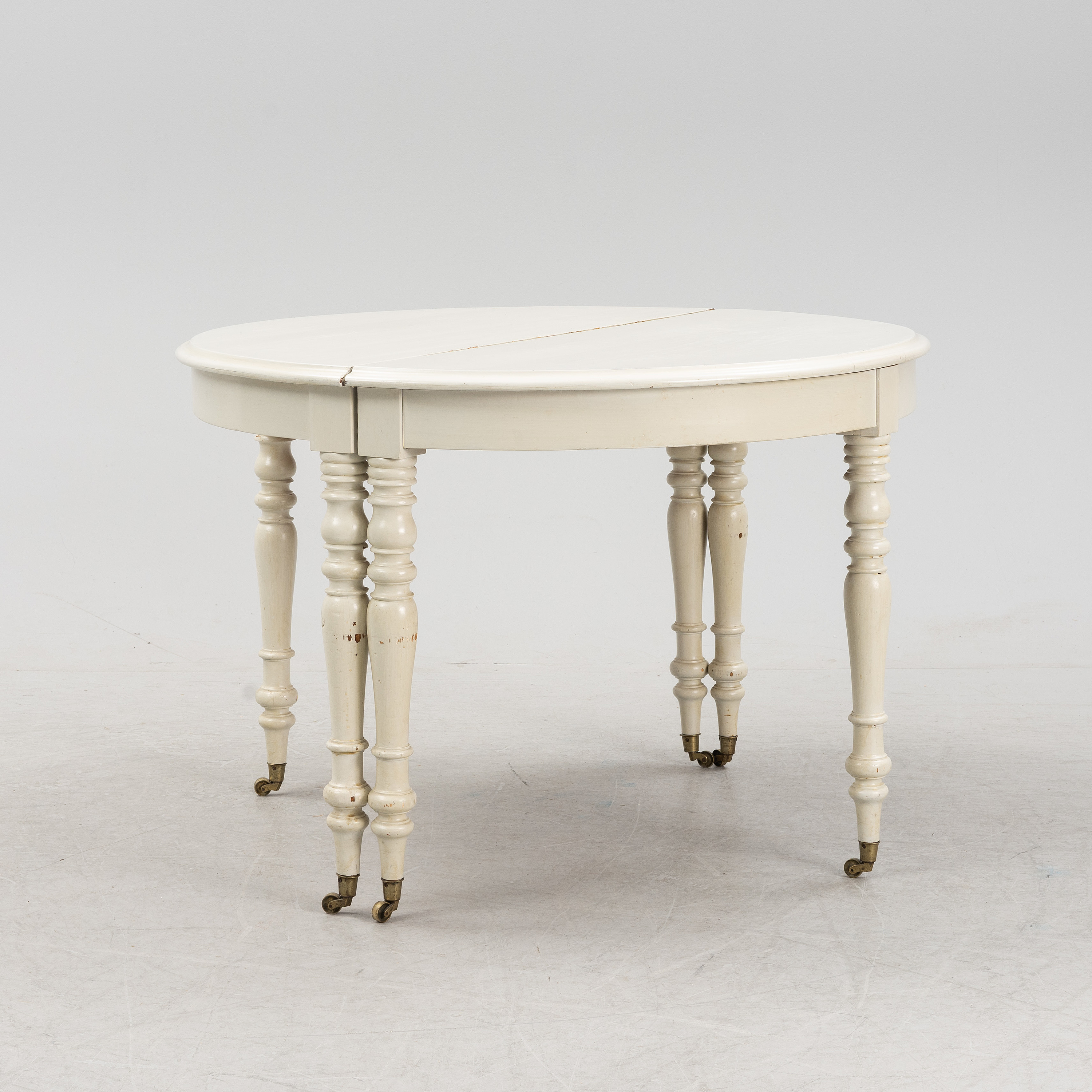 A painted dining table, circa 1900. - Bukowskis