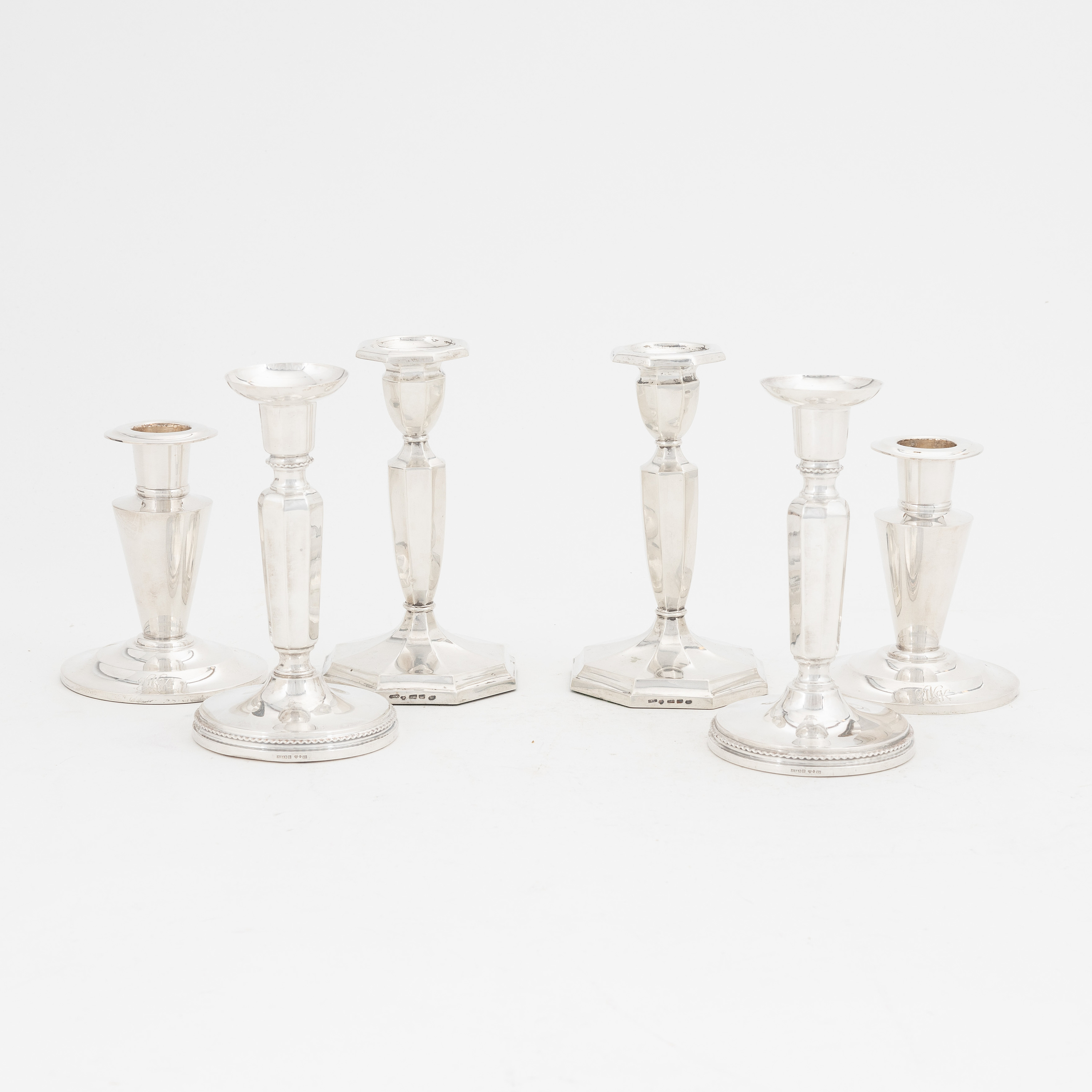 Three pairs of silver candlesticks, Finnish and Swedish hallmarks 1927 ...