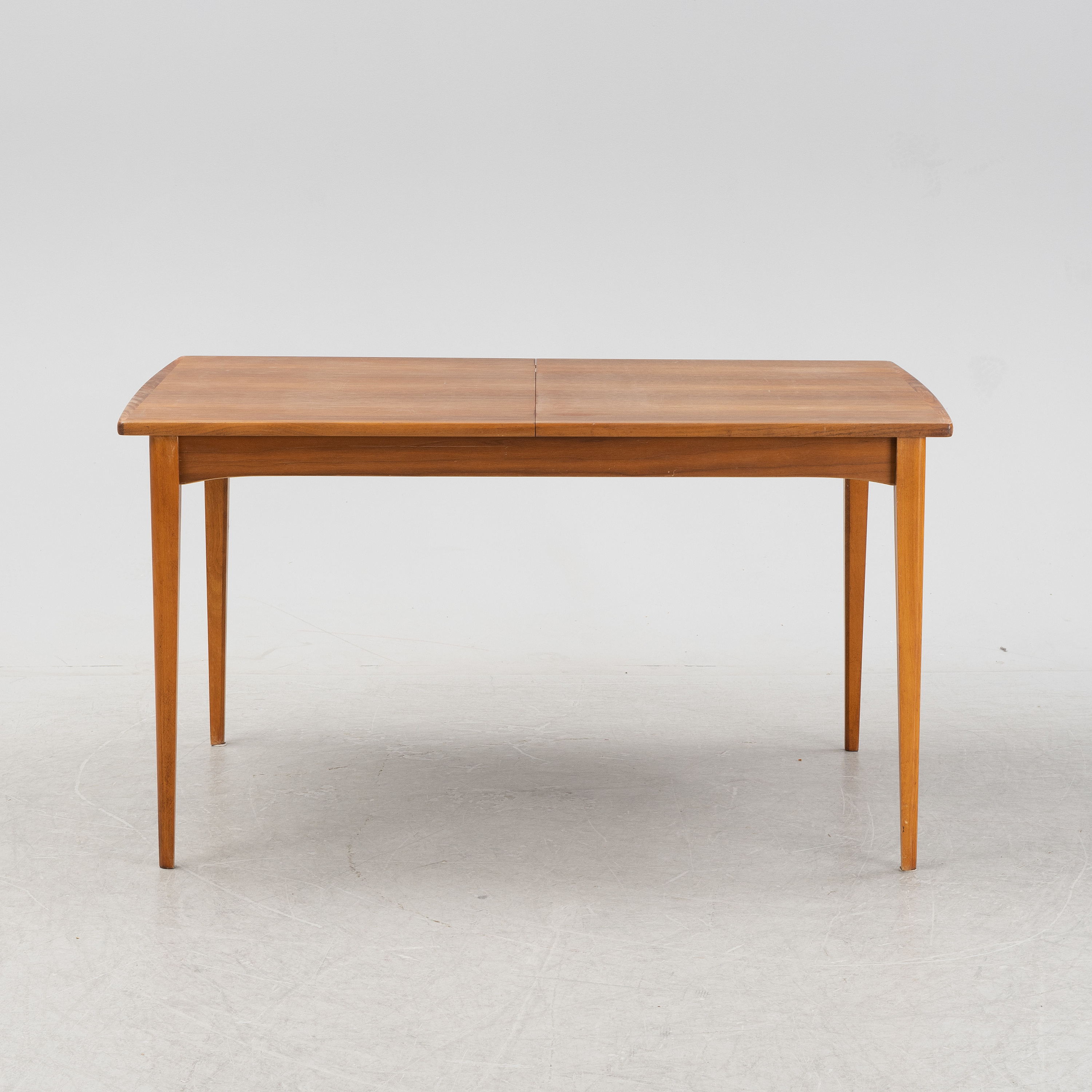 A teak veneered dining table, second half of the 20th Century. - Bukowskis