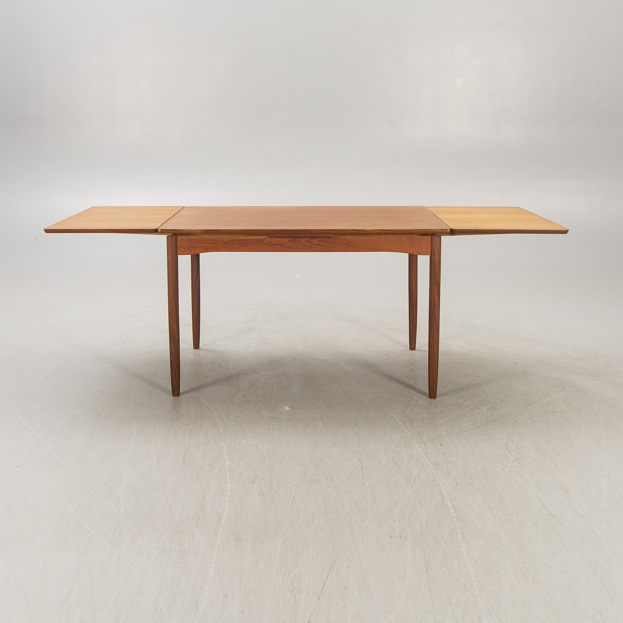 A Danish 1960s teak dining table. - Bukowskis