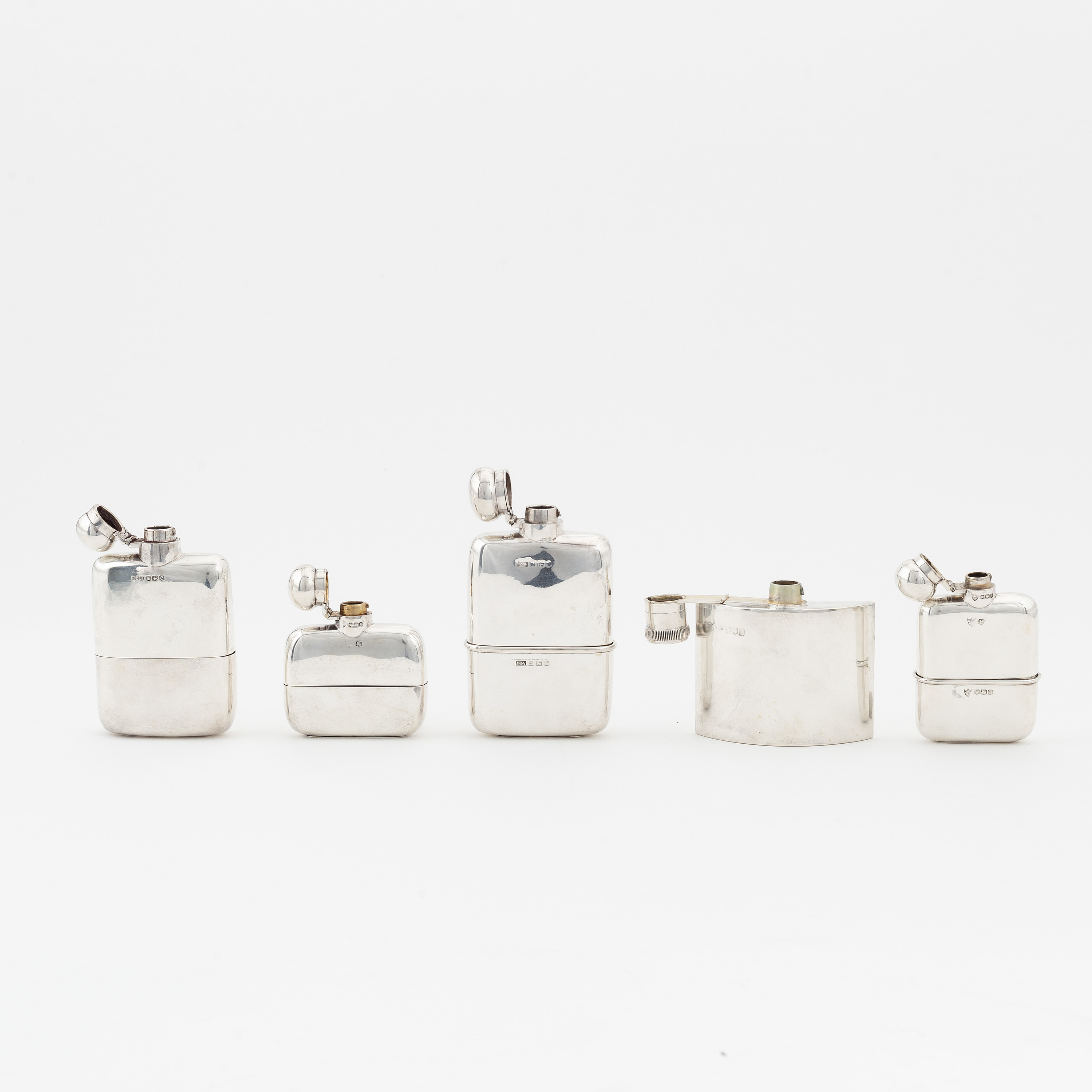 Five silver flasks England, including John Collard Vickery, Birmingham ...