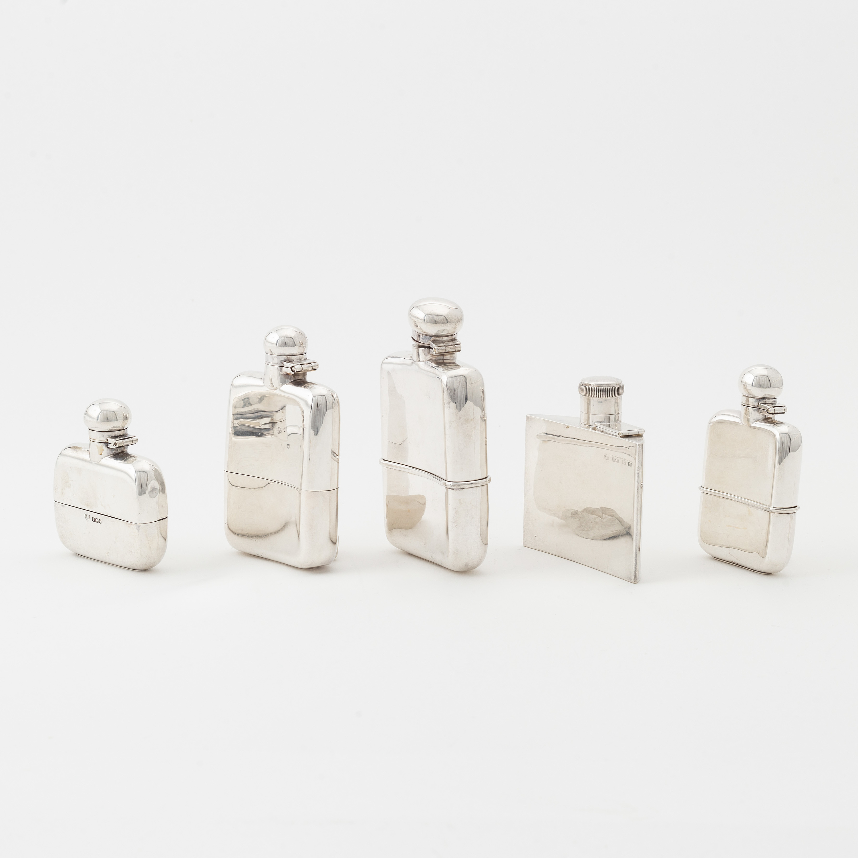 Five silver flasks England, including John Collard Vickery, Birmingham ...