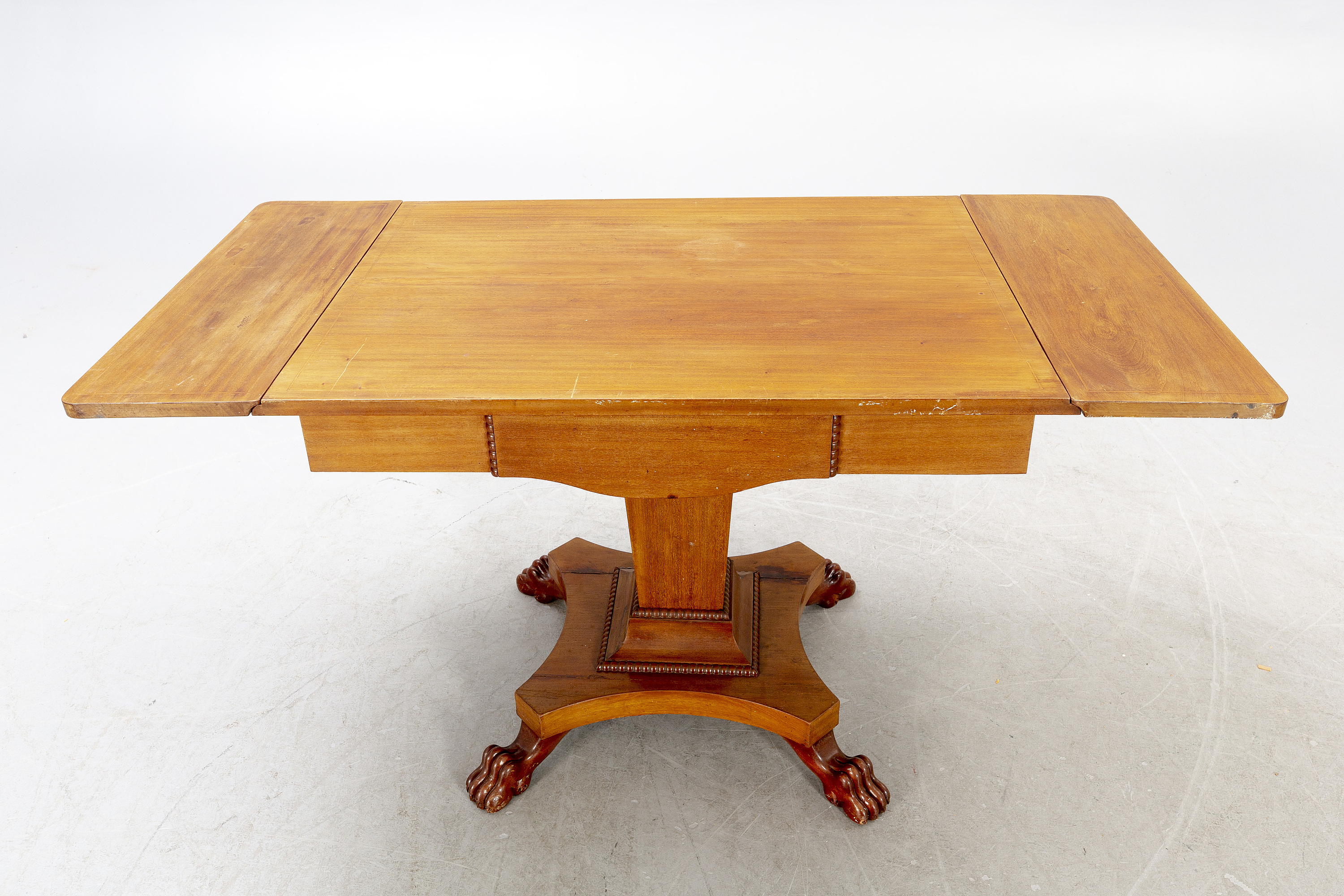 An Empire style mahogany table early 1900s. - Bukowskis