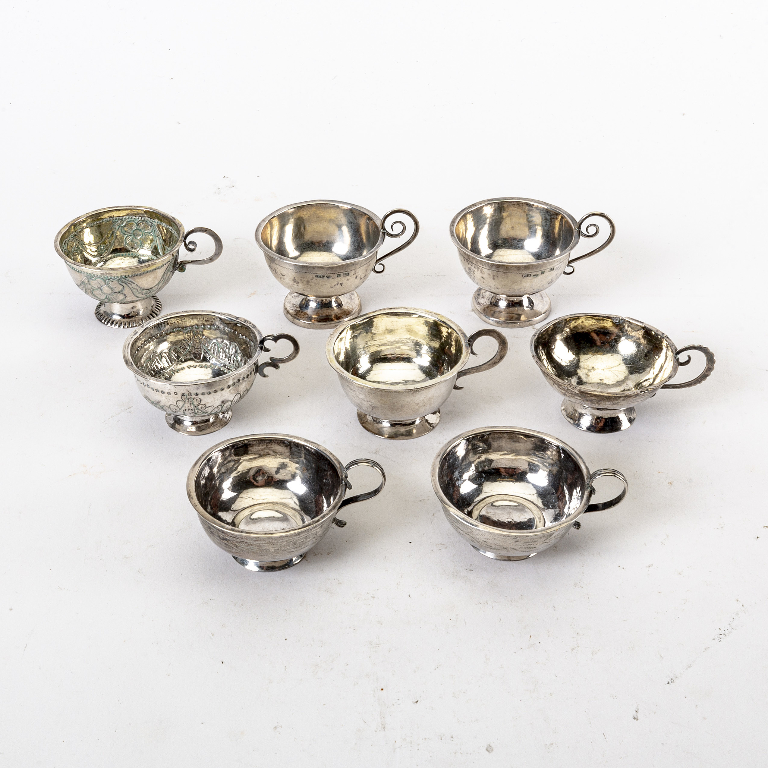A Swedish 19th century set of eight silver cups, weight 168 grams ...