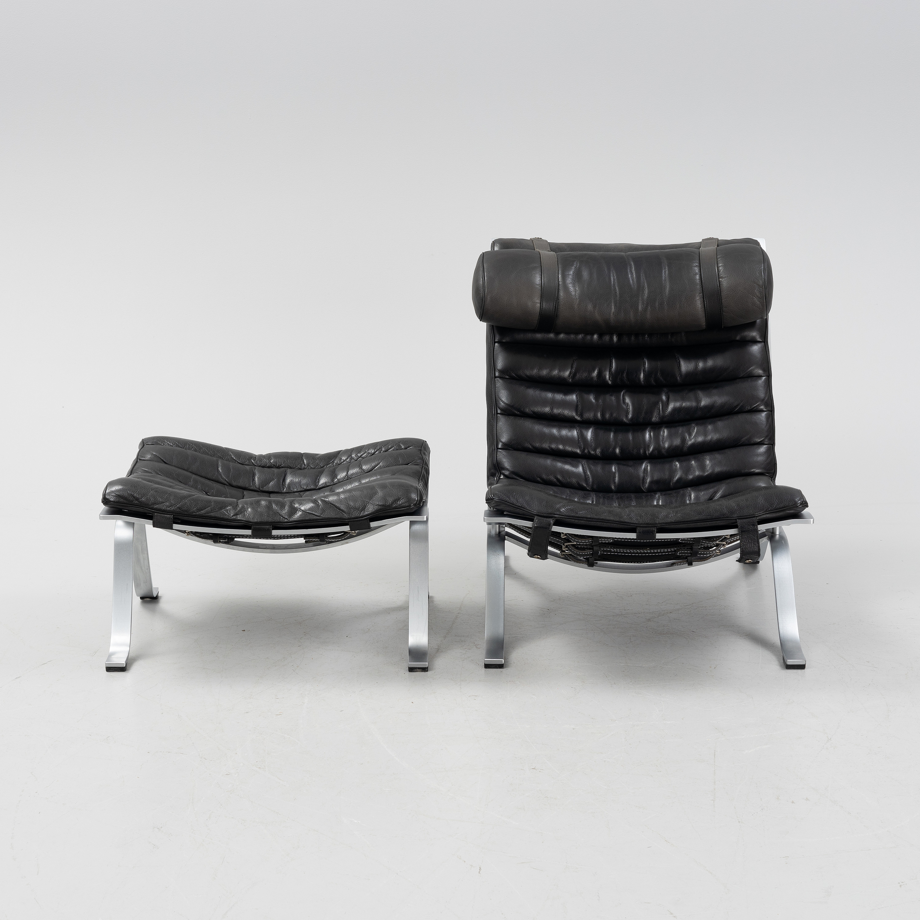 Arne Norell, an 'Ari' lounge chair and foot stool from Norell Möbler ...